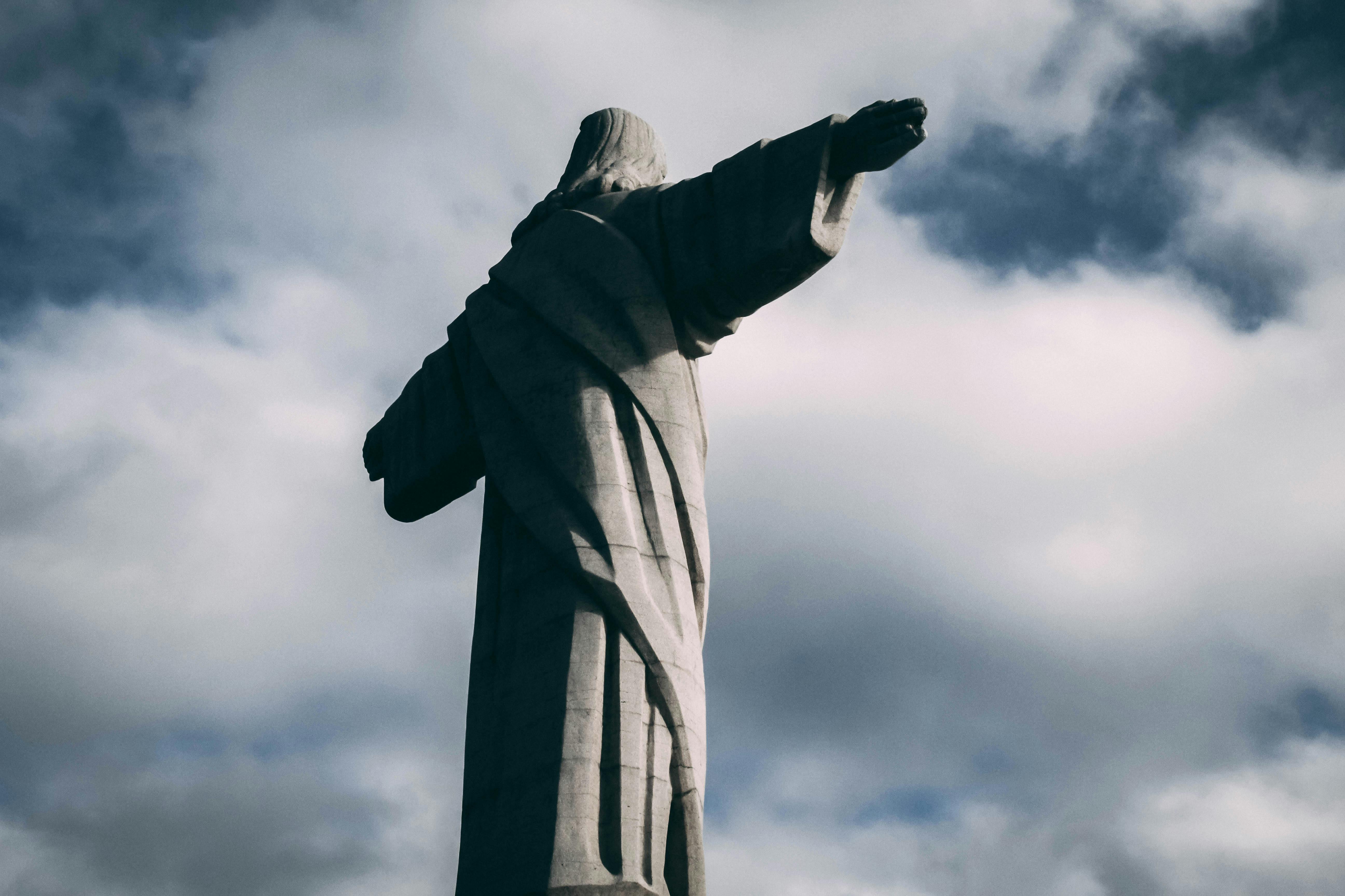 Statue of Jesus Christ on mount in evening · Free Stock Photo