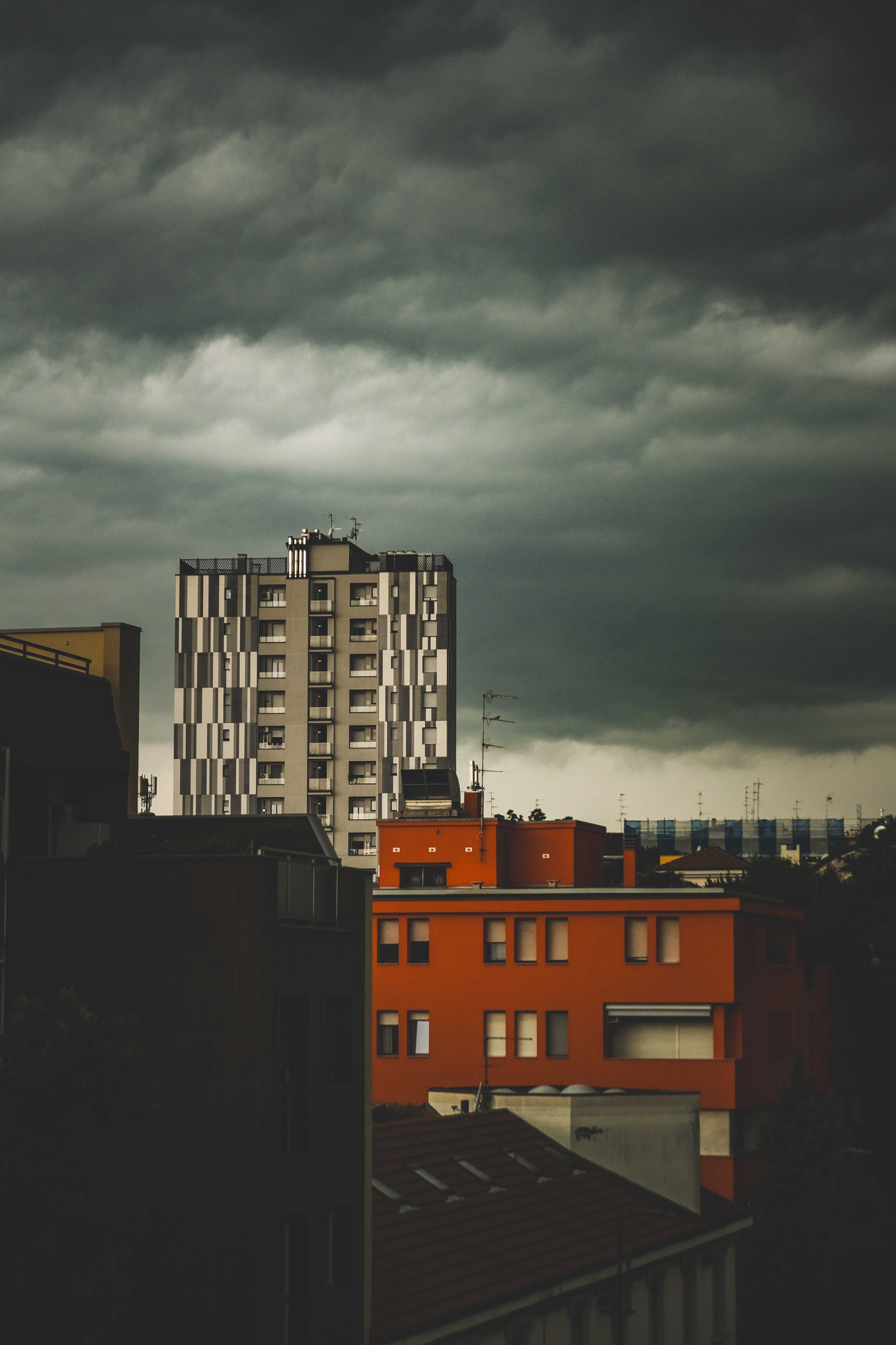 Rain Clouds over Buildings in Town · Free Stock Photo