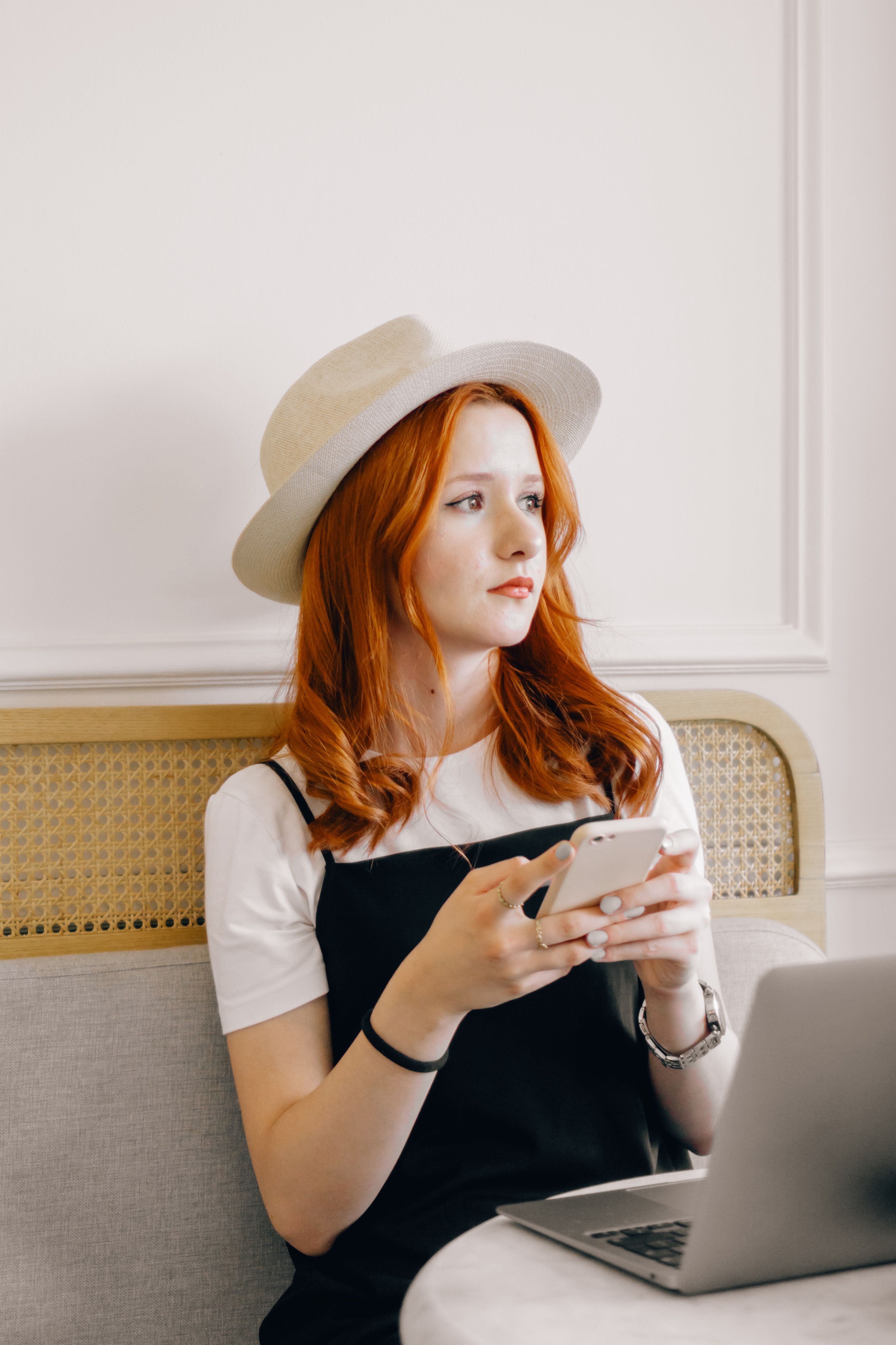 Woman Tapping on Smartphone · Free Stock Photo
