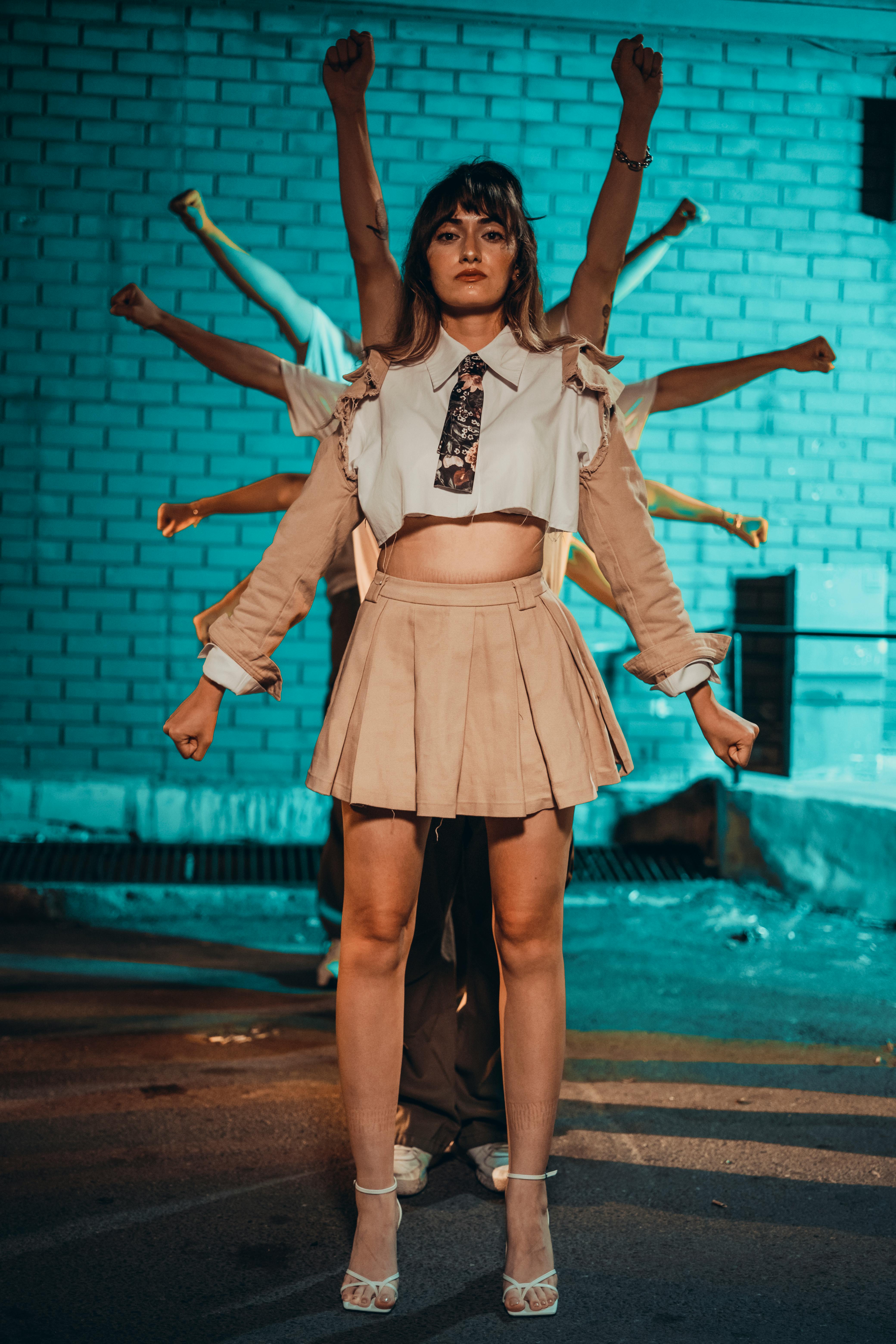 Woman Posing with Multiple Arms · Free Stock Photo