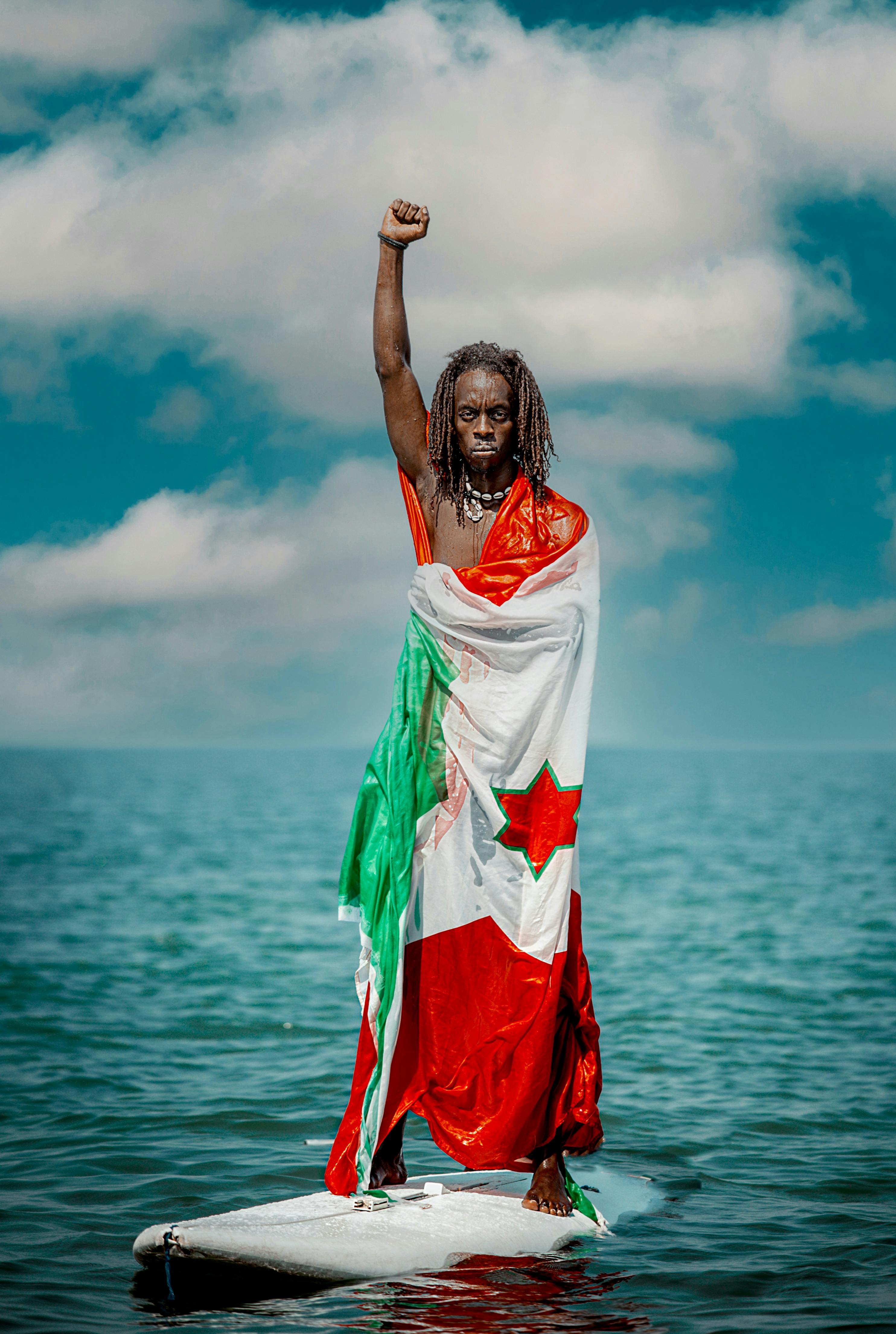 Man on Surfboard in Sea · Free Stock Photo