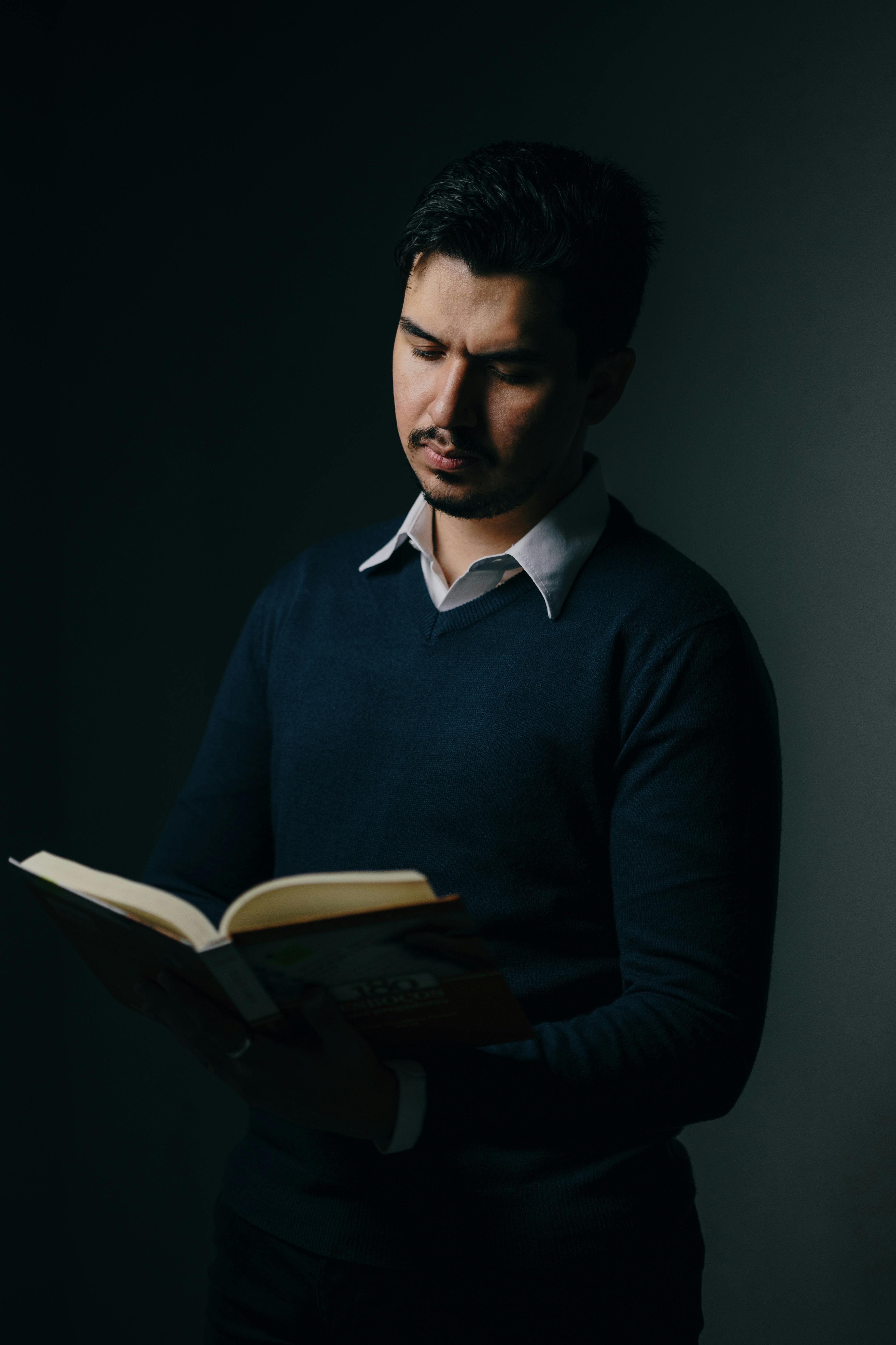 Elegant Man Reading a Book · Free Stock Photo