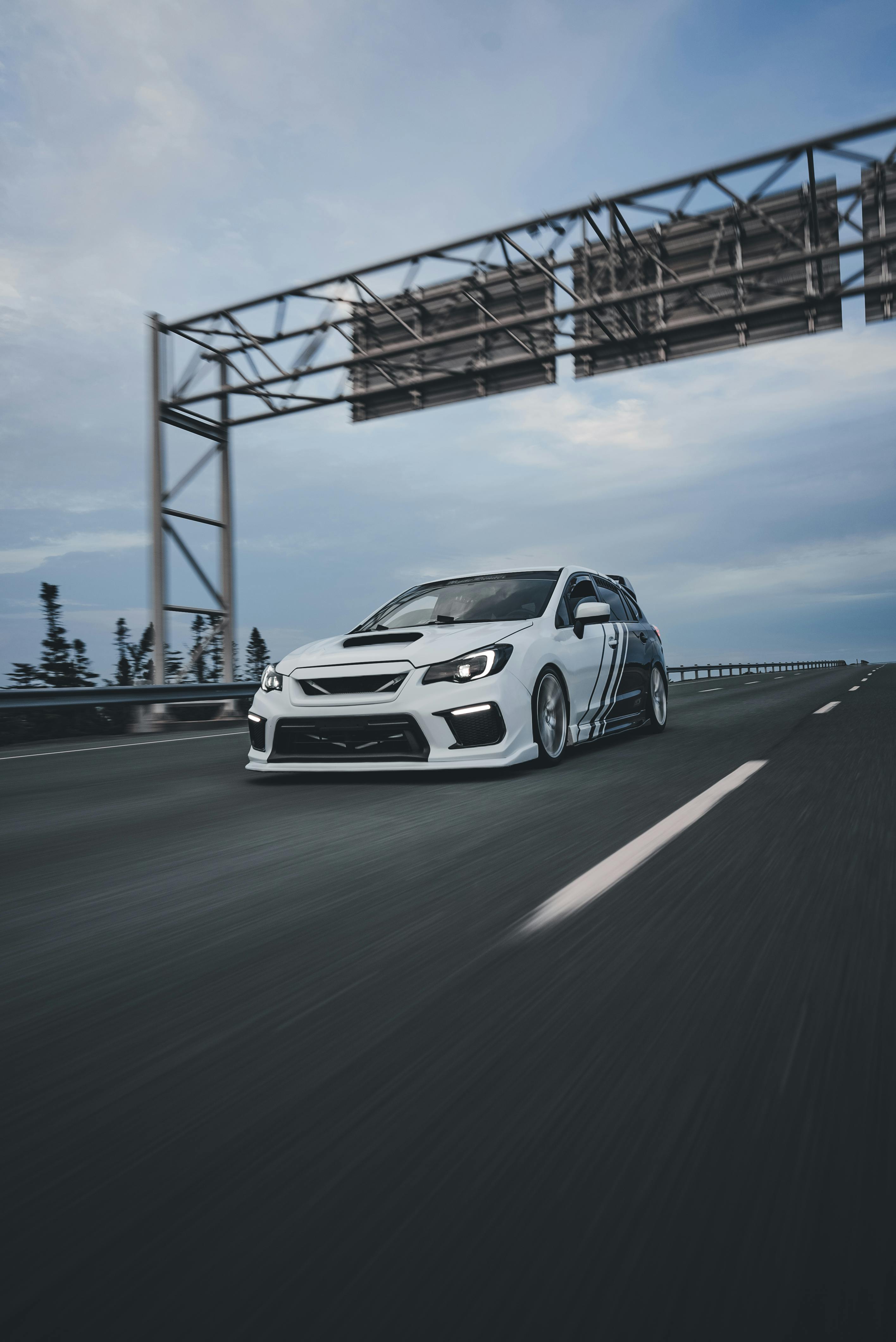 White Subaru Impreza on a Highway · Free Stock Photo