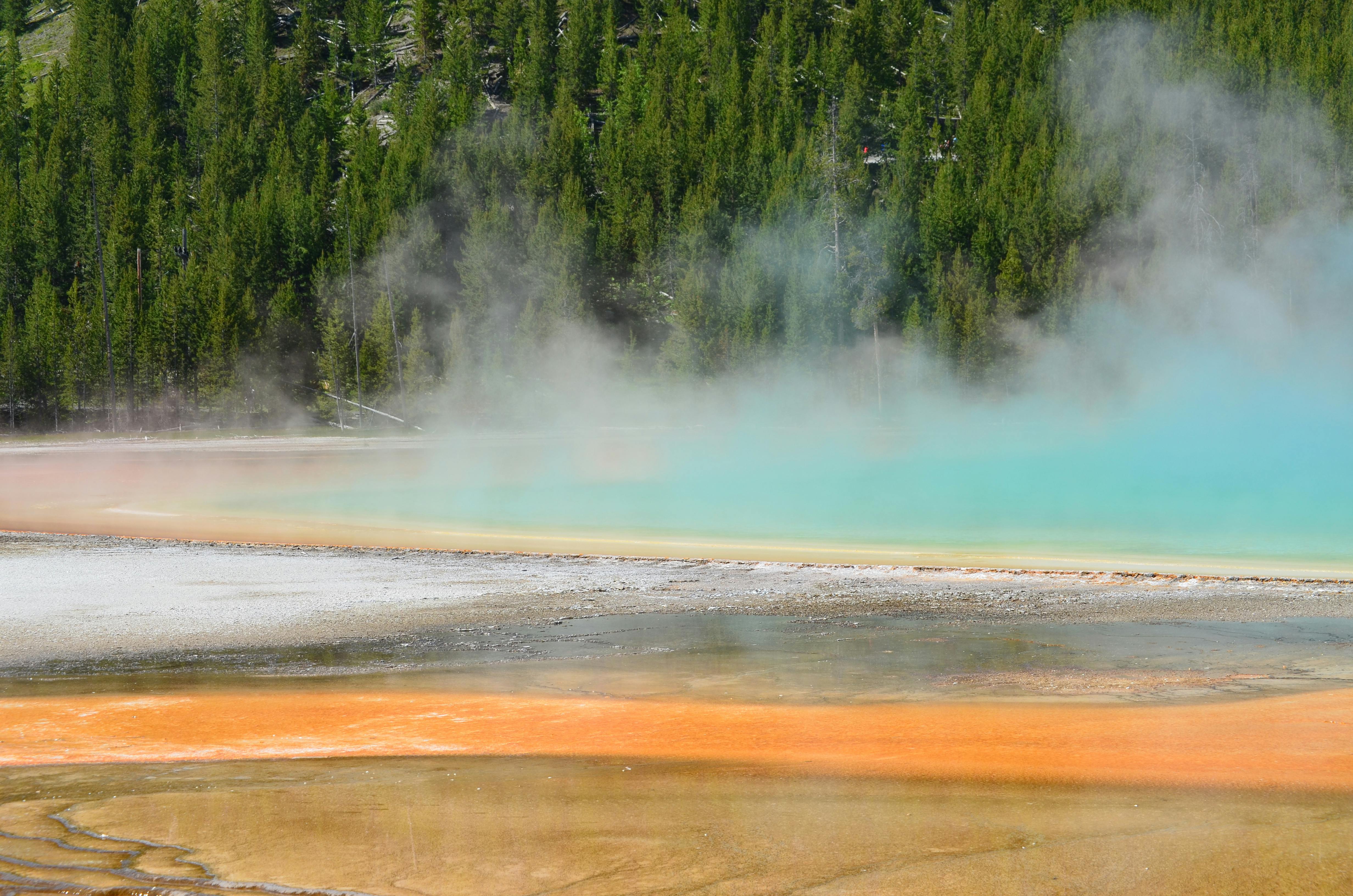 Green Forested Mountain and Hot Spring Under Blue Sky · Free Stock Photo