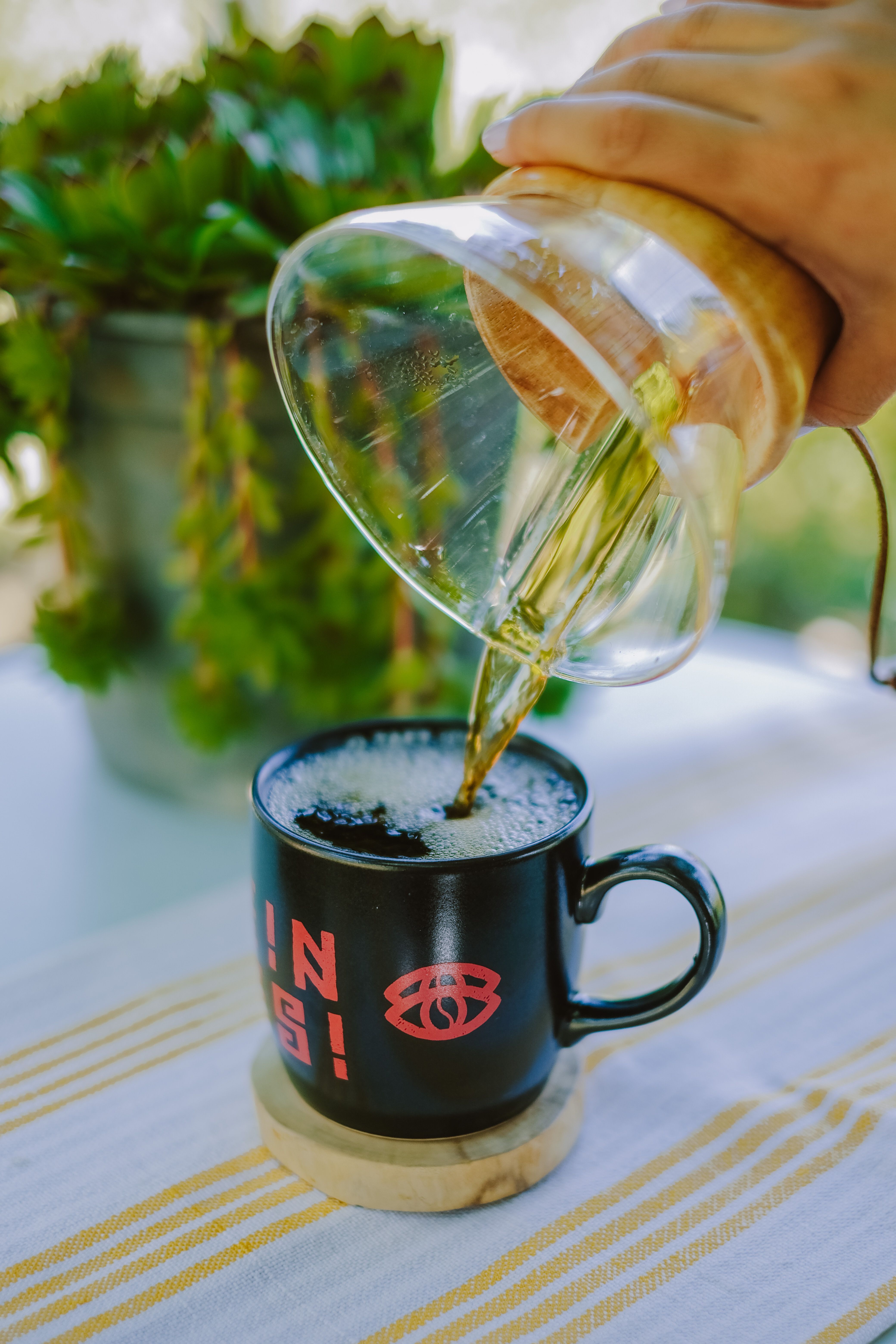 Close-up of Person Pouring Coffee from a Glass Pot into a Cup · Free ...