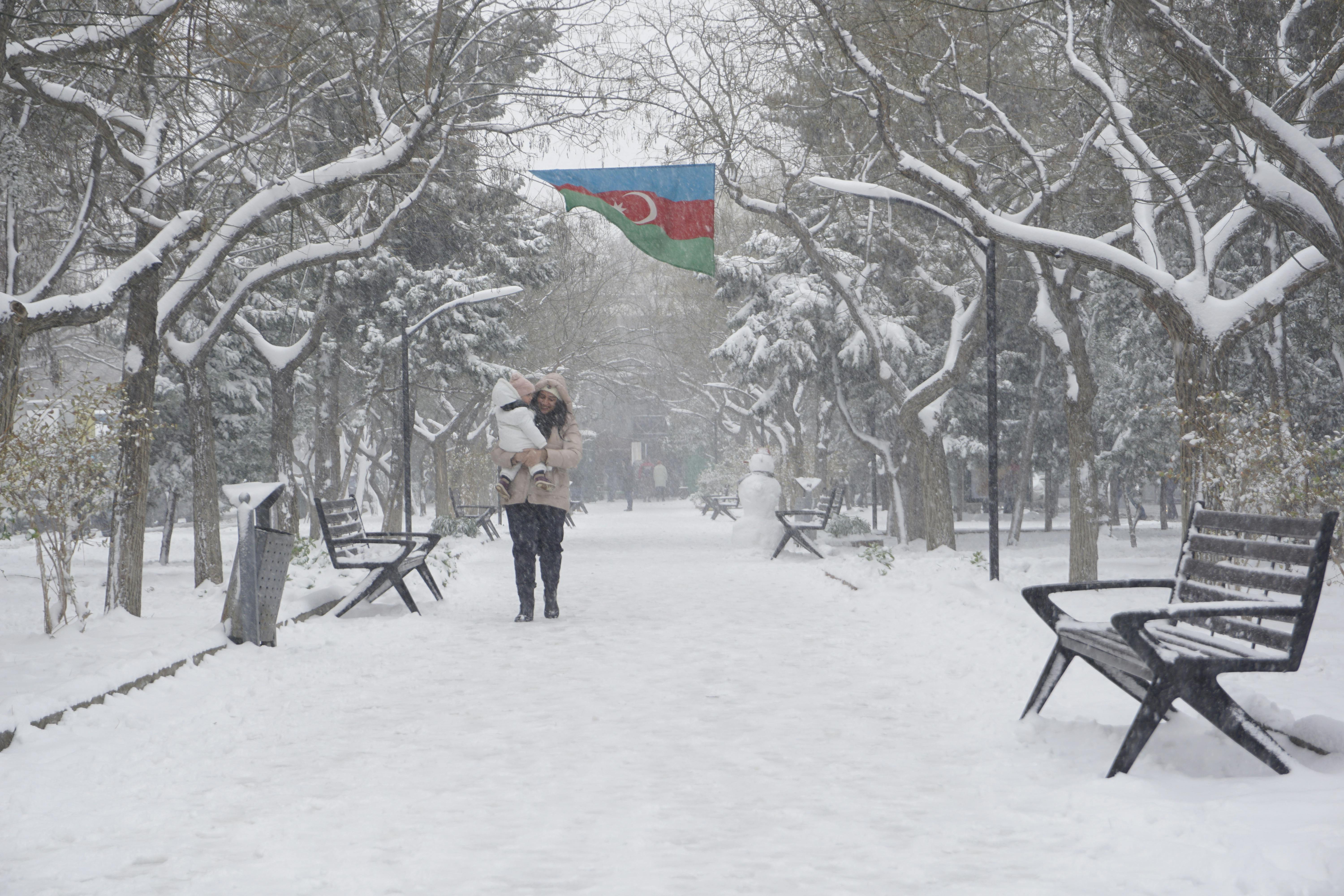 Mother with Baby at Park in Baku in Snow · Free Stock Photo