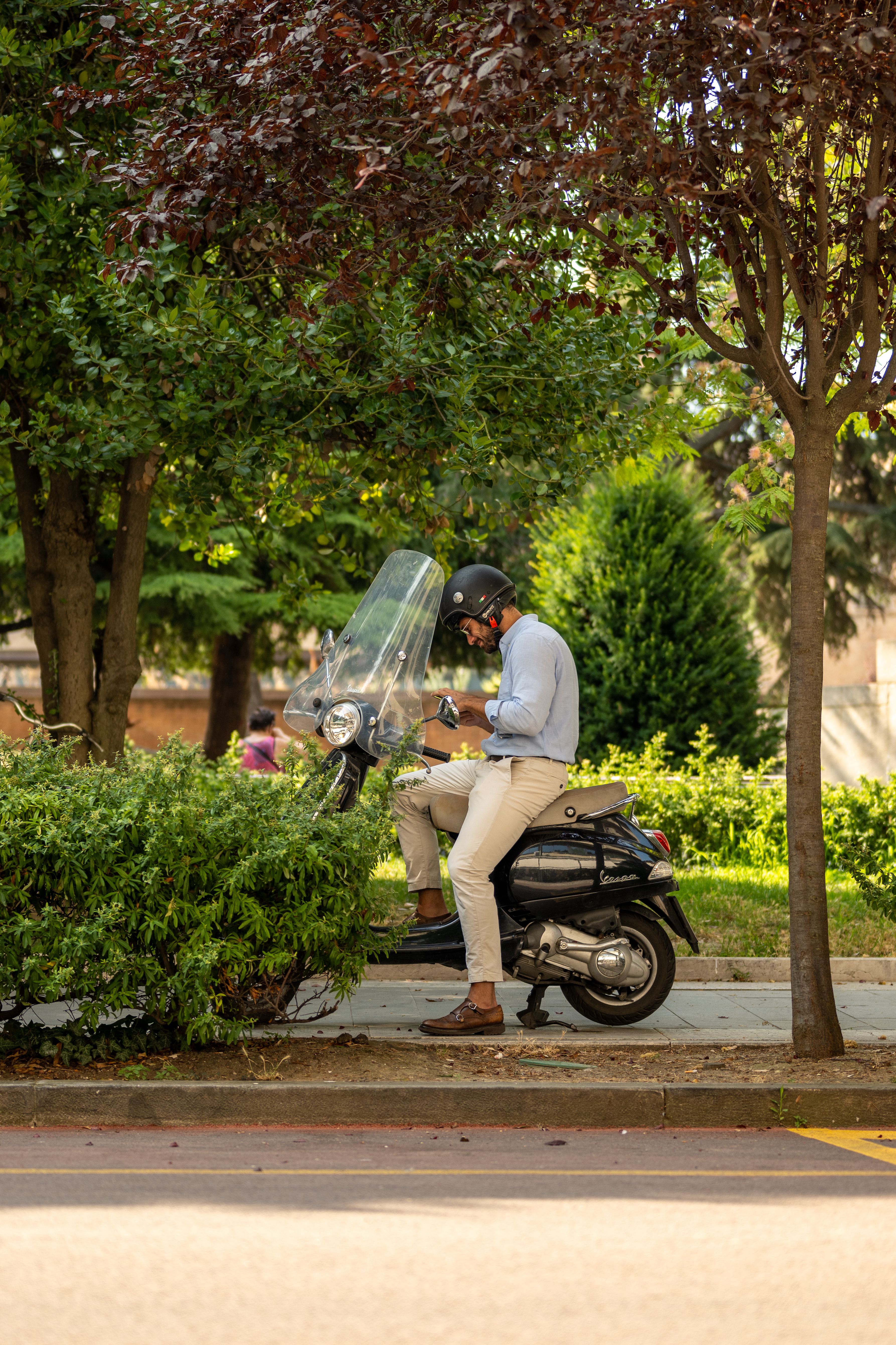 Man on Motor Scooter on Street · Free Stock Photo