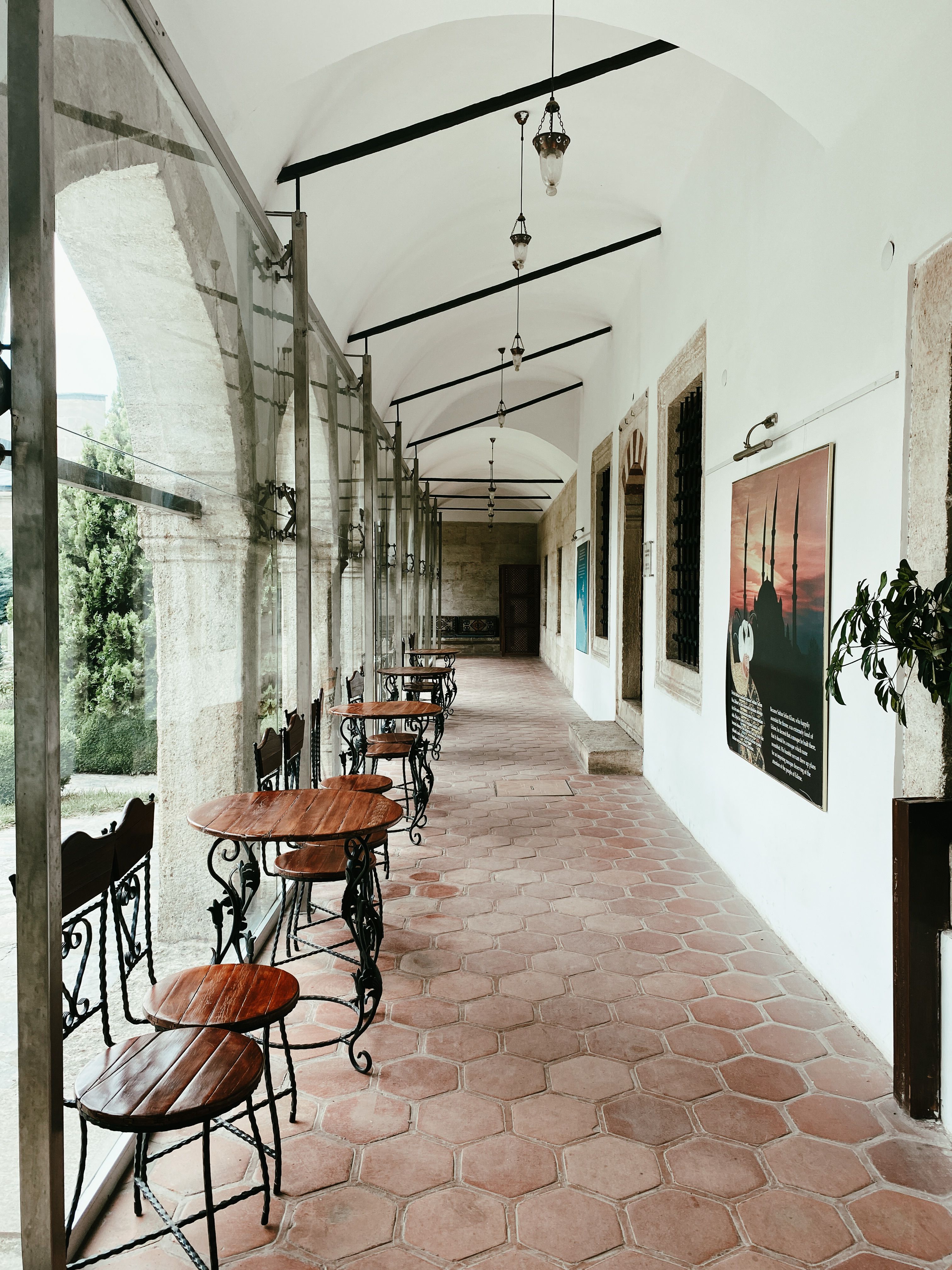 Tables in a Cloister · Free Stock Photo