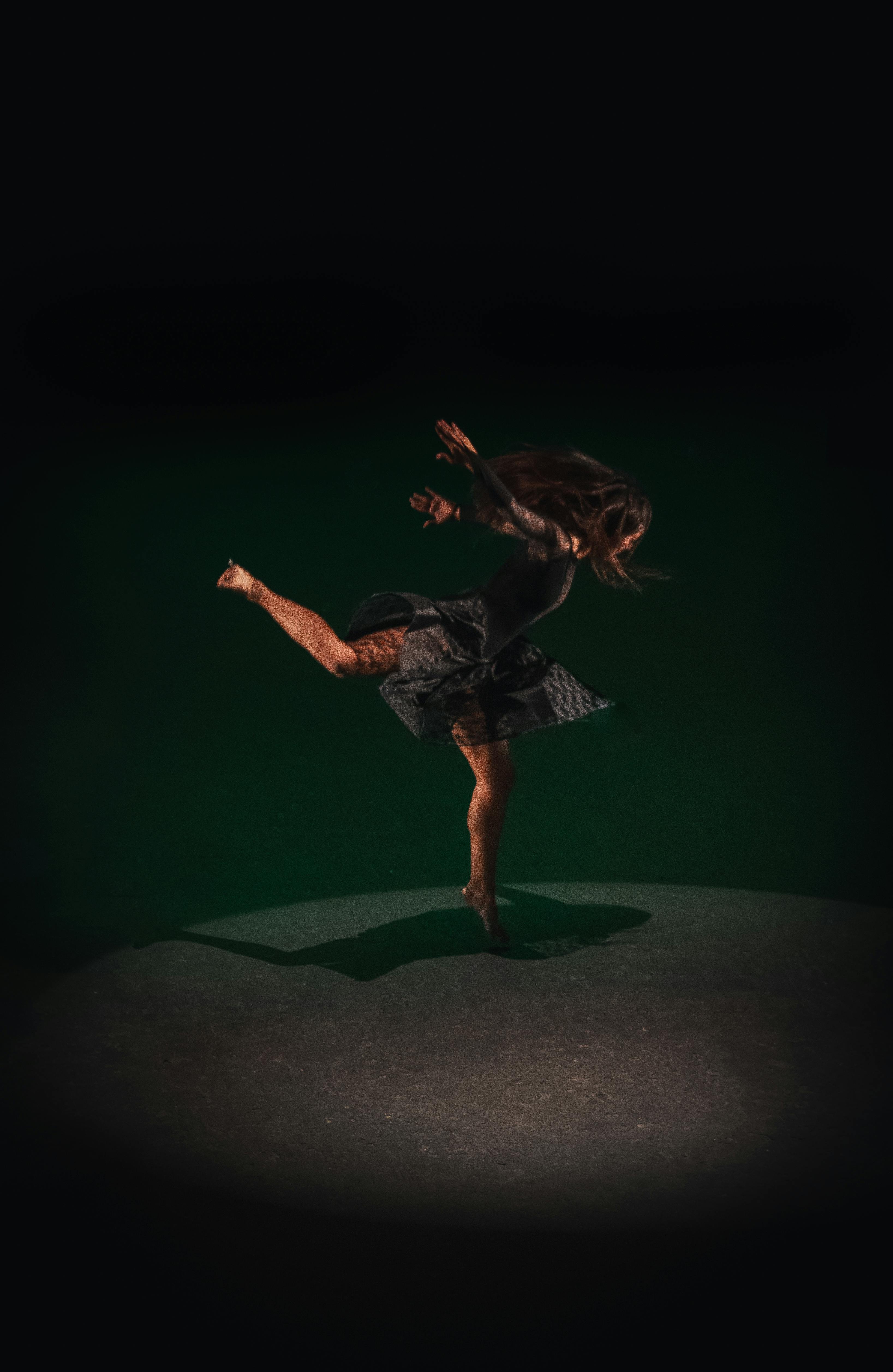 Woman Dancing in Dark · Free Stock Photo