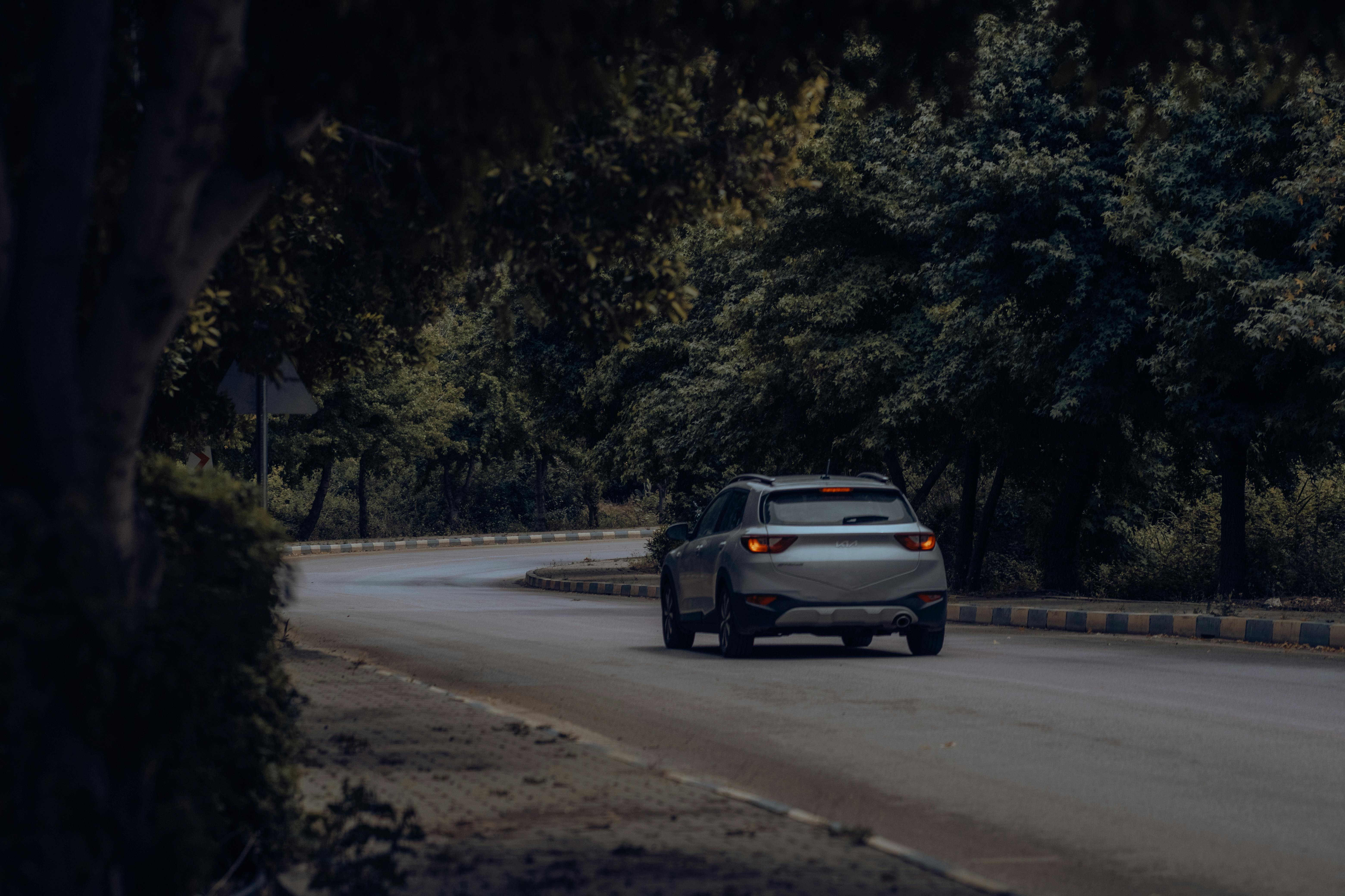 Car Running on Road · Free Stock Photo