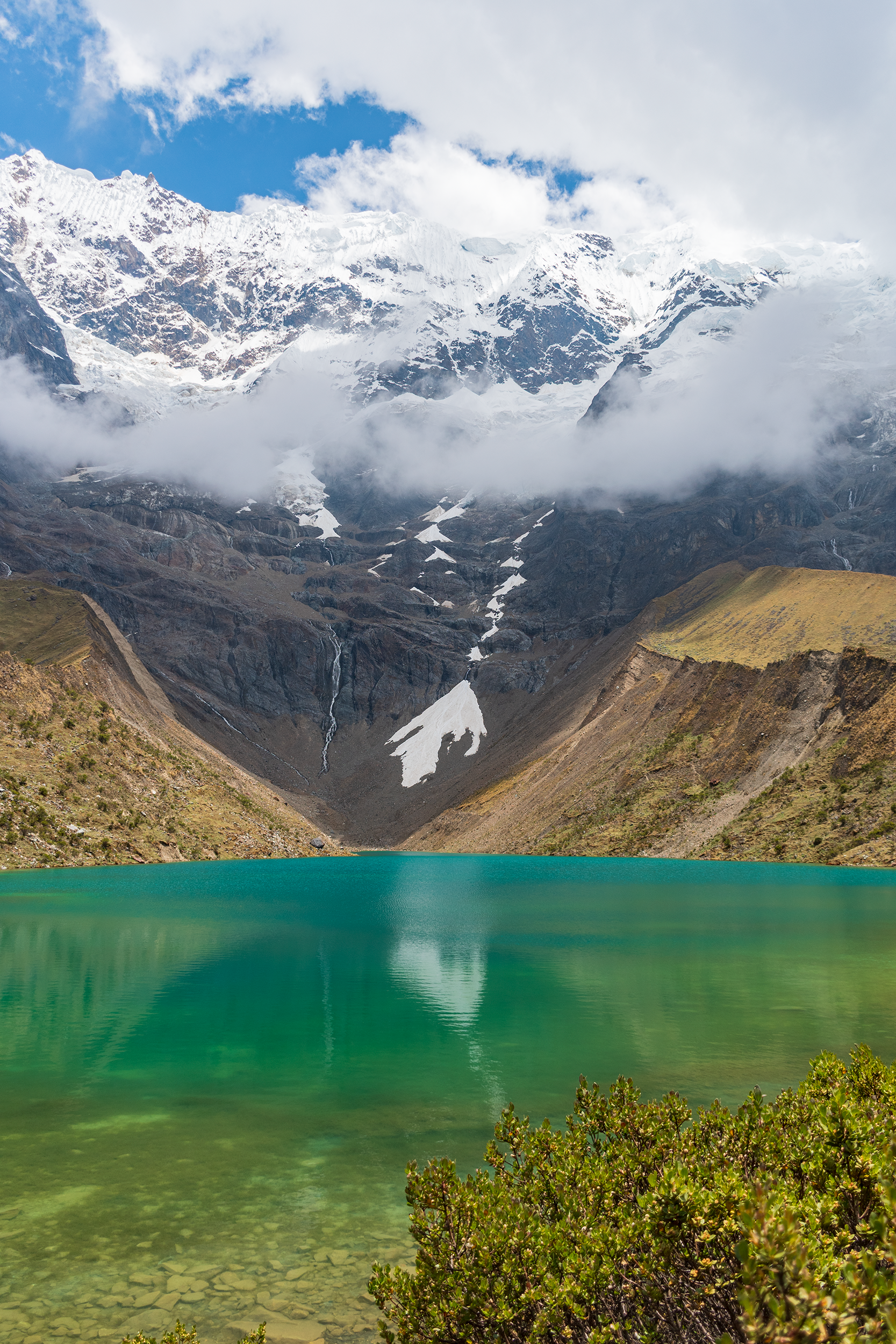 Lake at the Bottom of Snowed Mountain · Free Stock Photo
