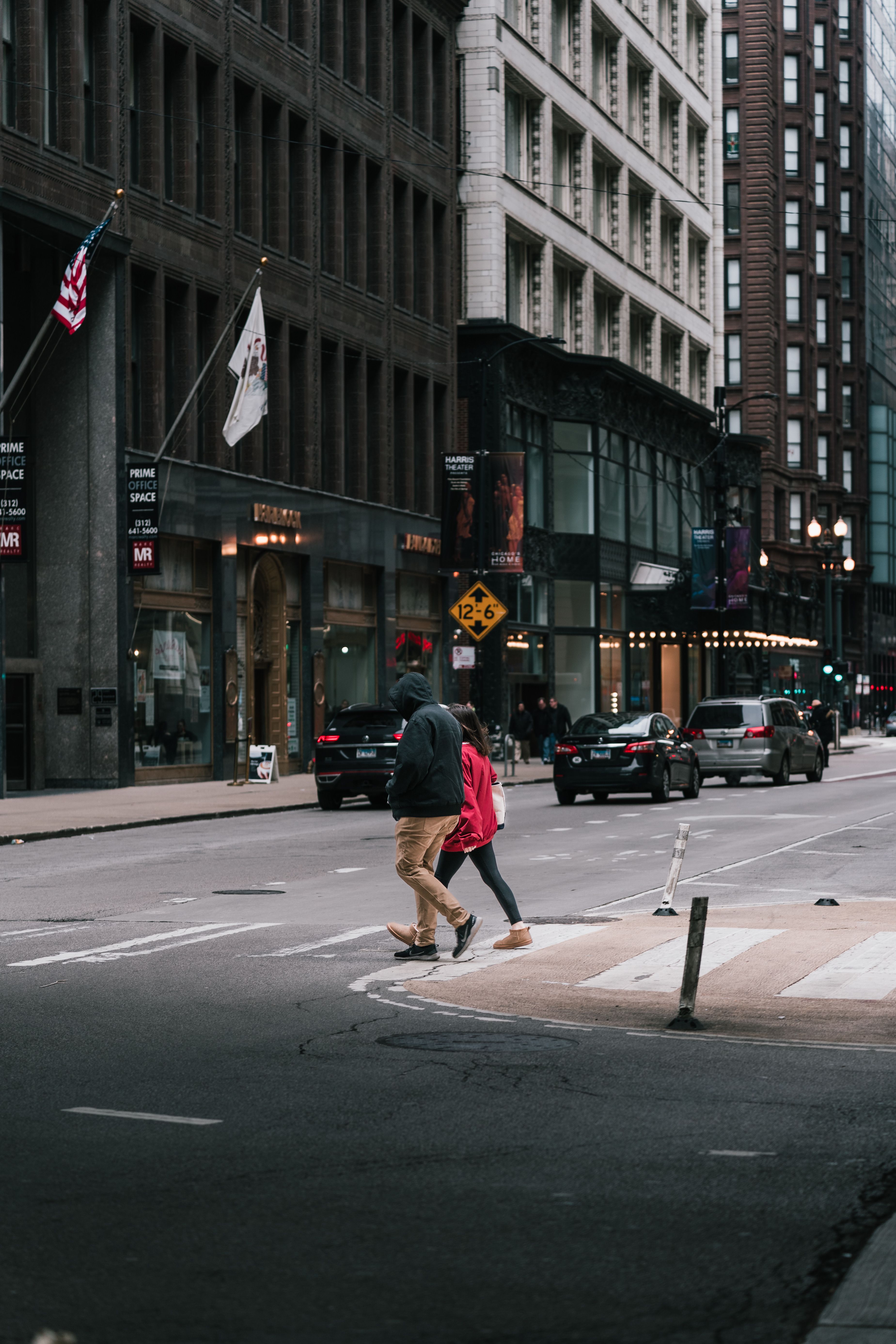 Couple Talking on the Sidewalk · Free Stock Photo