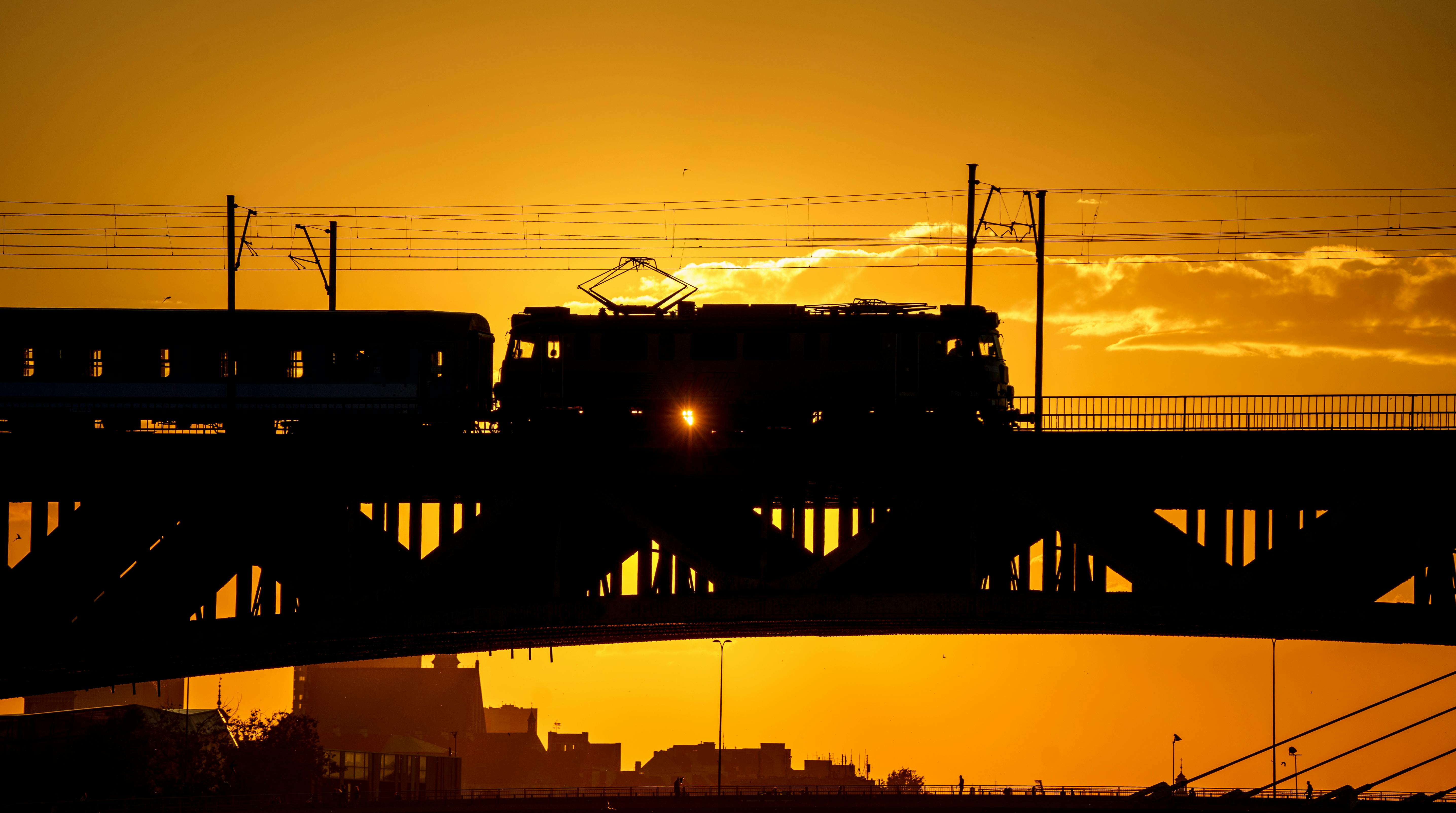 Tram on Bridge at Sunset · Free Stock Photo