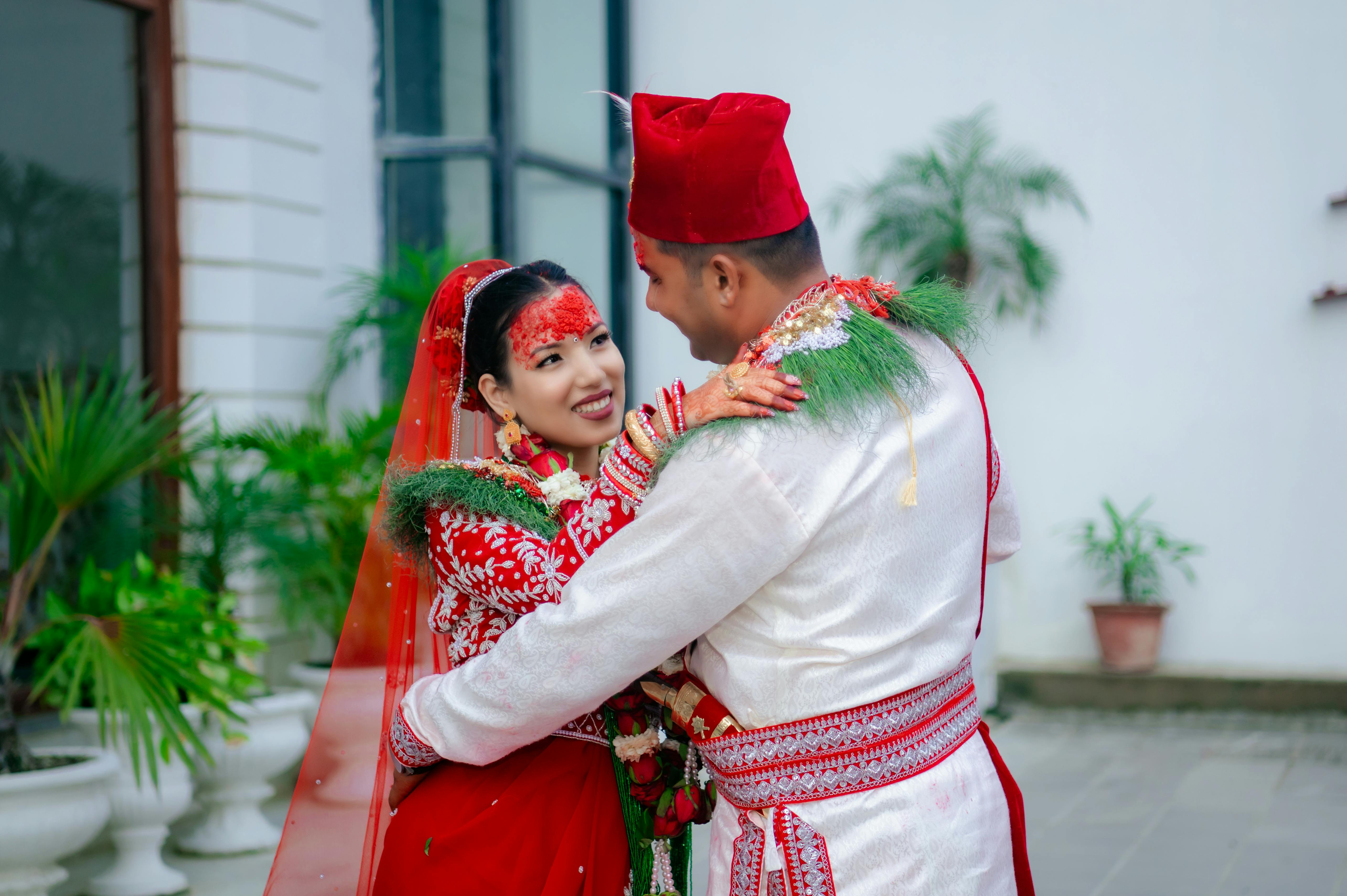 Couple in Traditional Clothing Dancing Together · Free Stock Photo