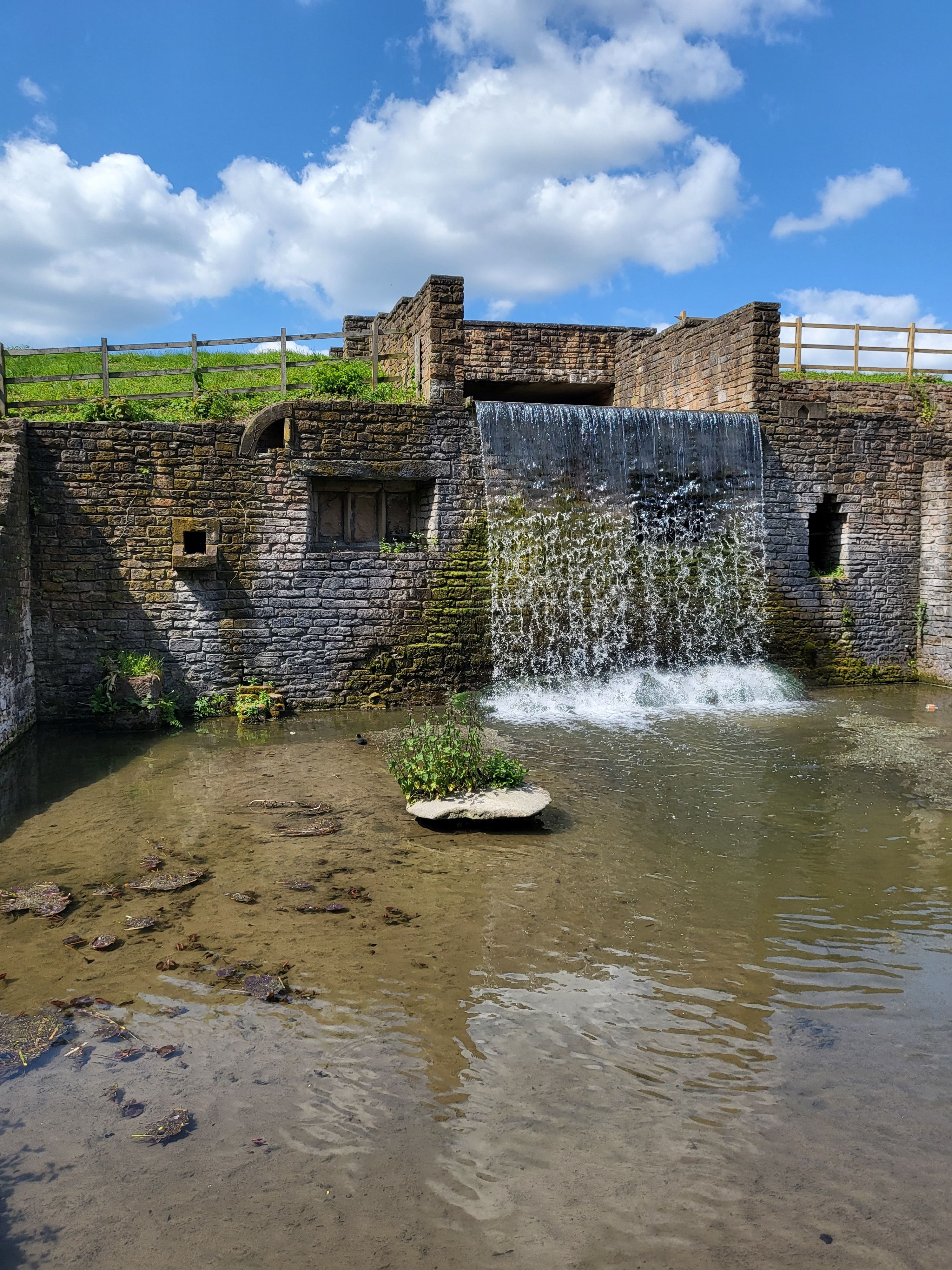 Artificial Waterfalls on Sides of River · Free Stock Photo
