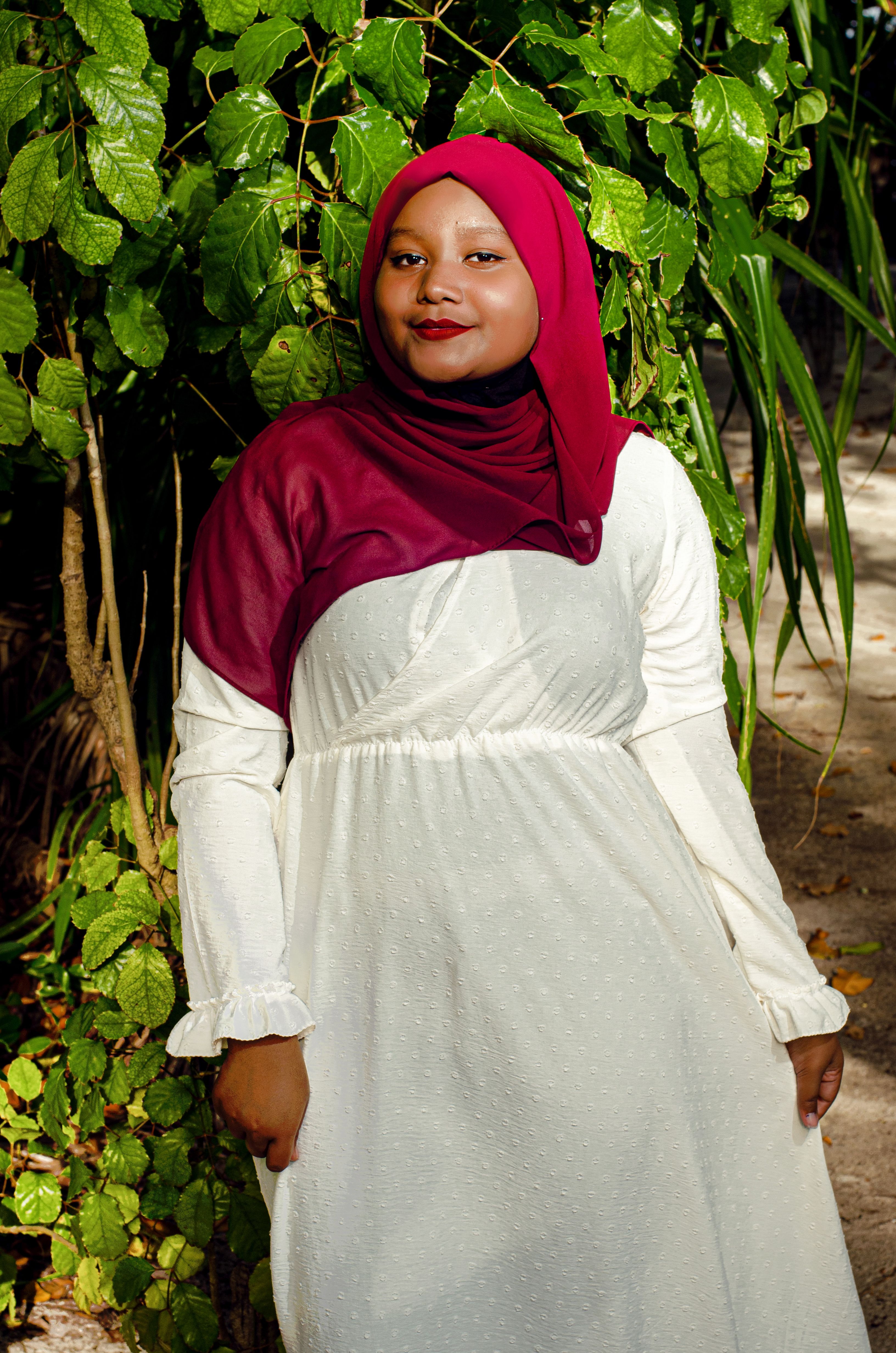 Woman in Hijab Standing with Folded Hands · Free Stock Photo