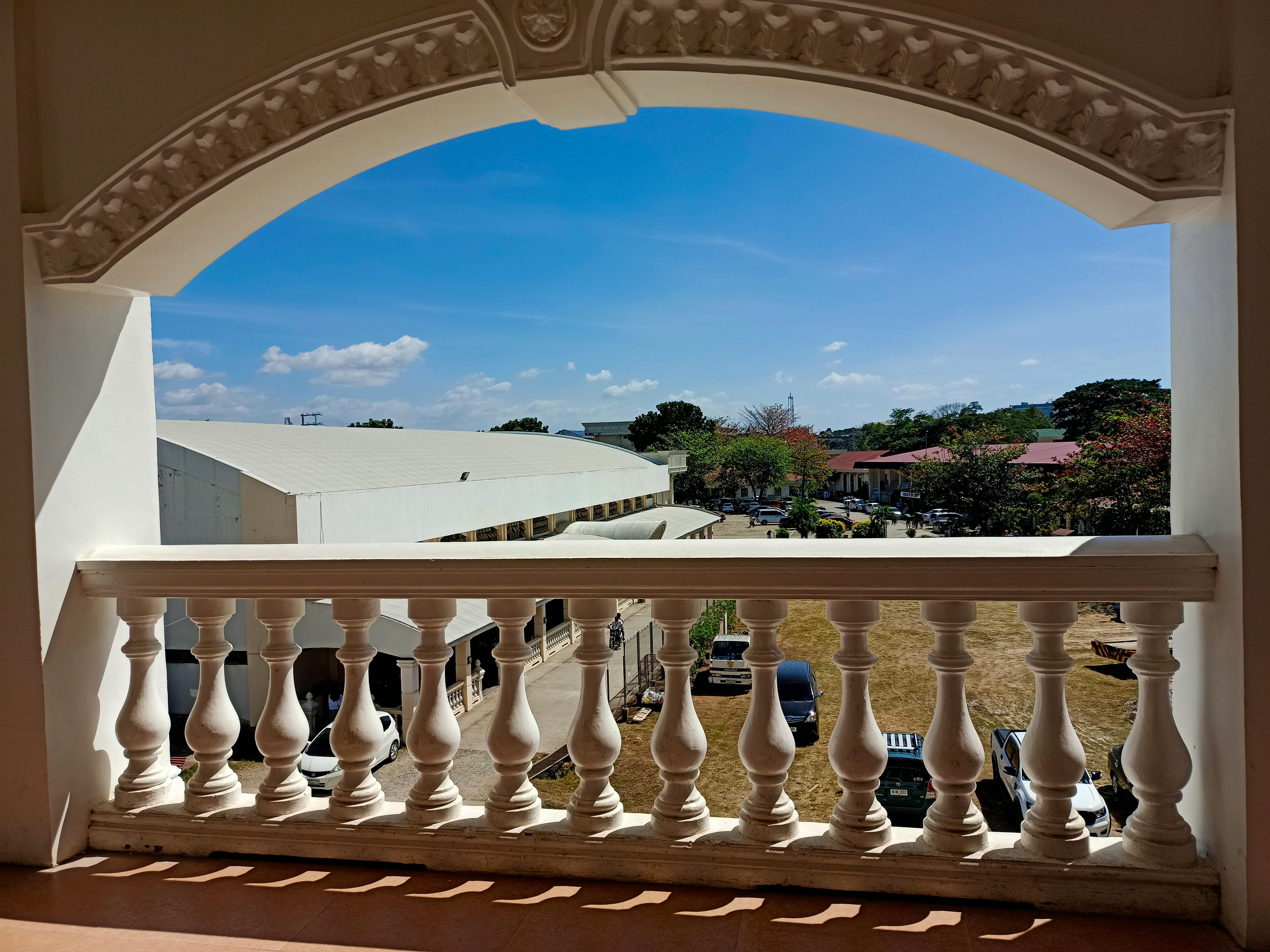 Building Corner behind Railing and Canal · Free Stock Photo