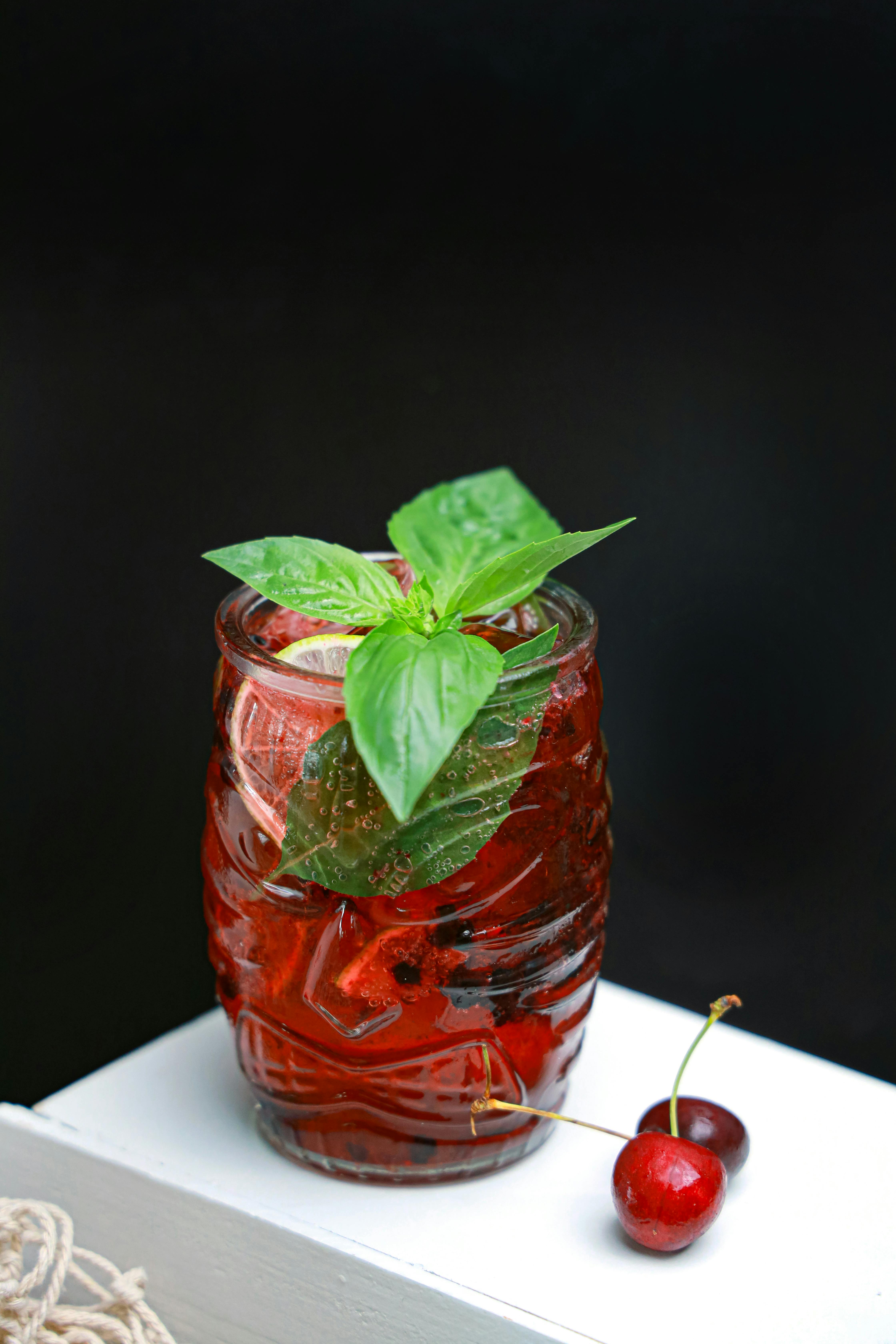 Red Cherry Cocktail with Mint Leaves · Free Stock Photo
