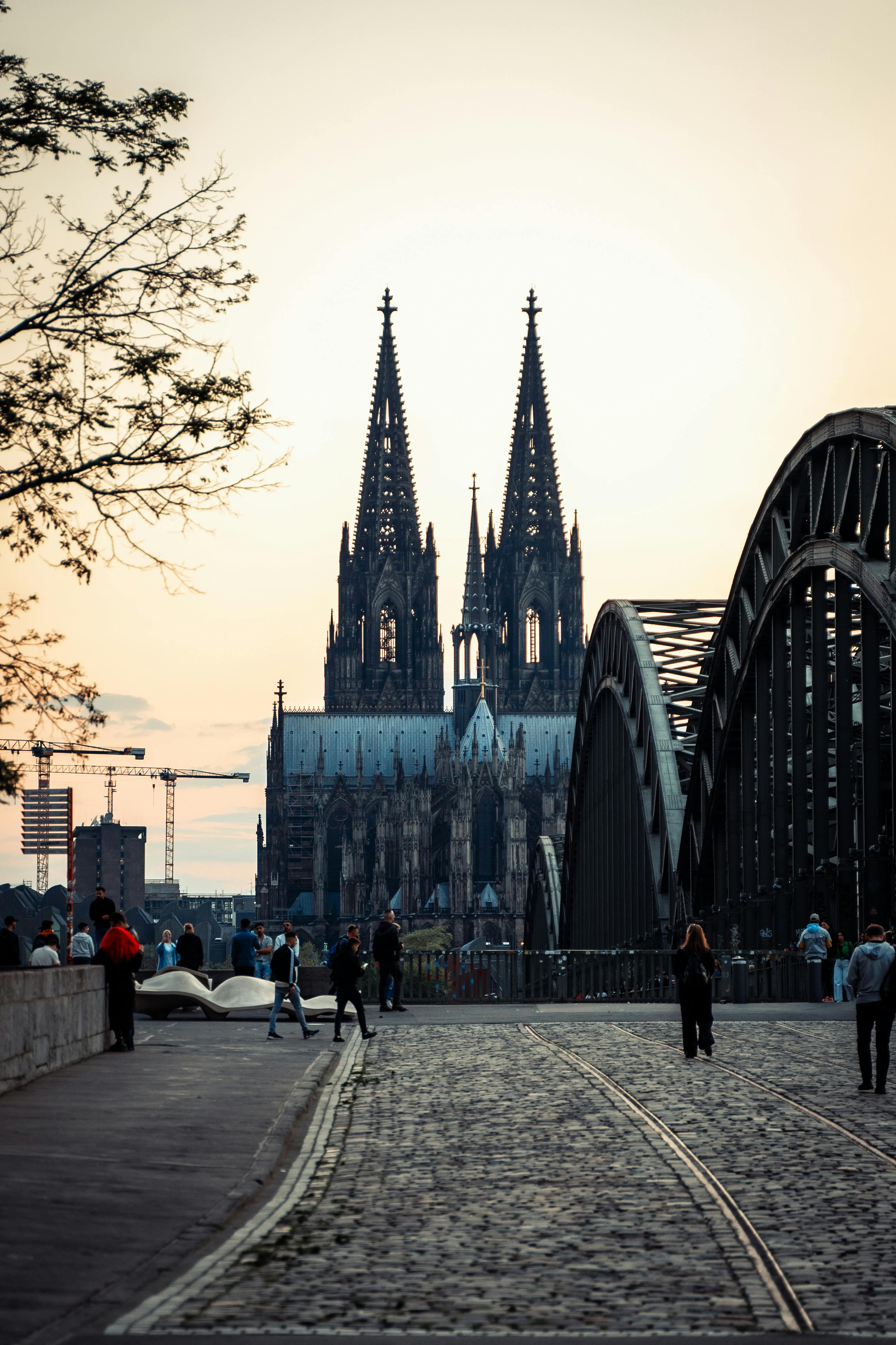 Gothic Cologne Cathedral Seen from Hohenzollern Bridge · Free Stock Photo