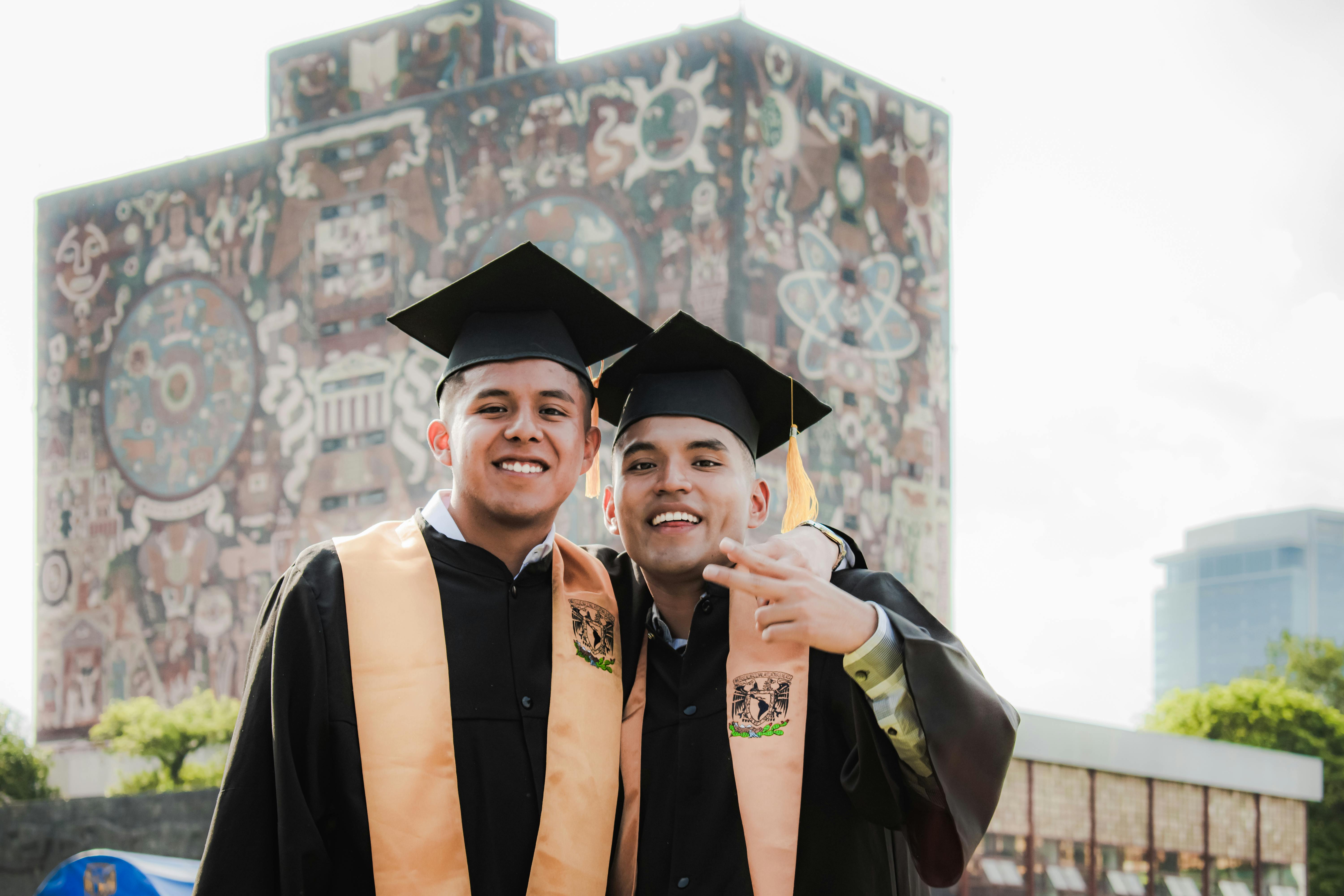 Two Young Men in Graduation Gowns and Caps, Mexico City · Free Stock Photo