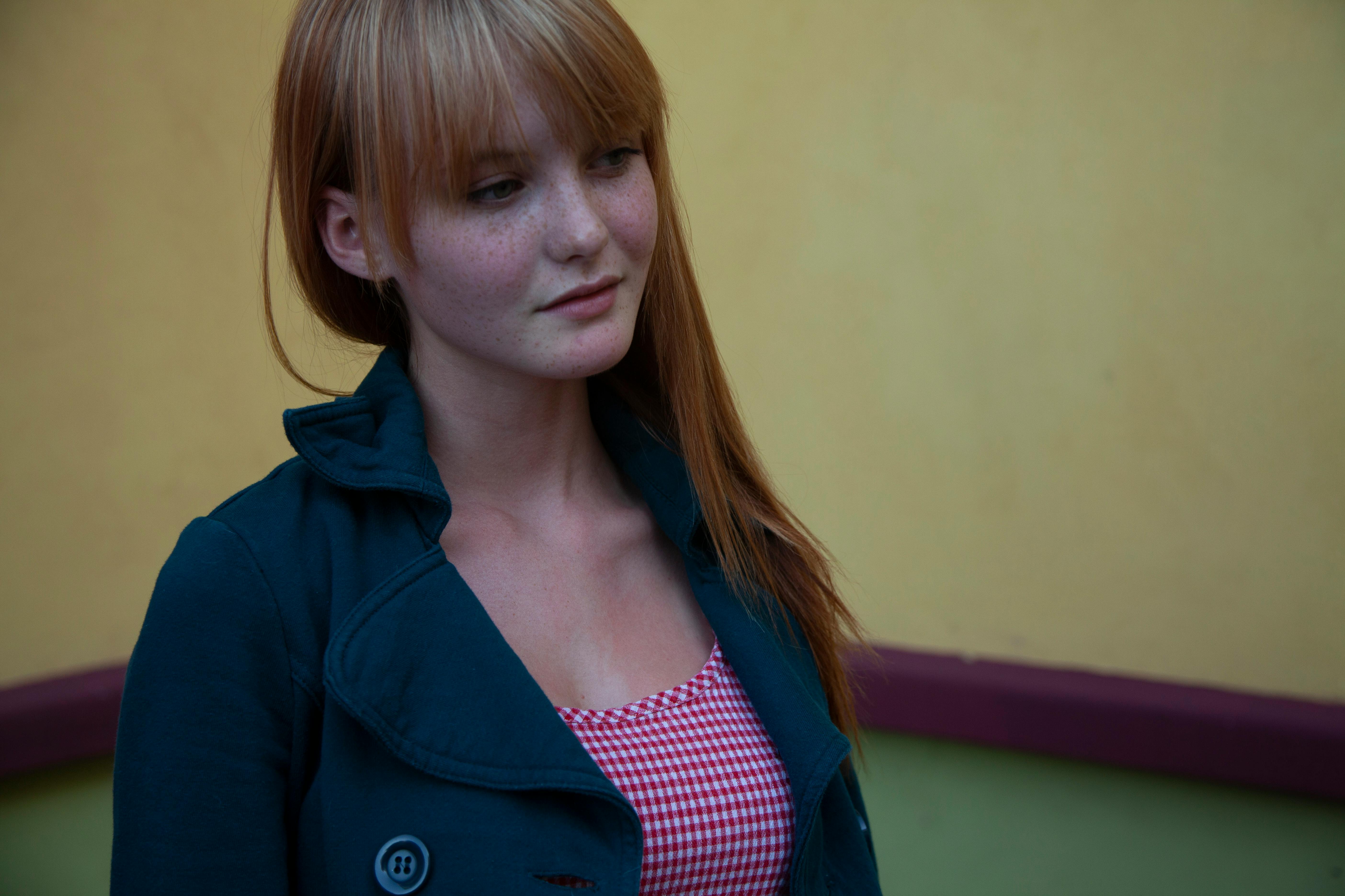 Young Brunette Woman in Black PVC Matrix Style Trench Coat Posing at a ...