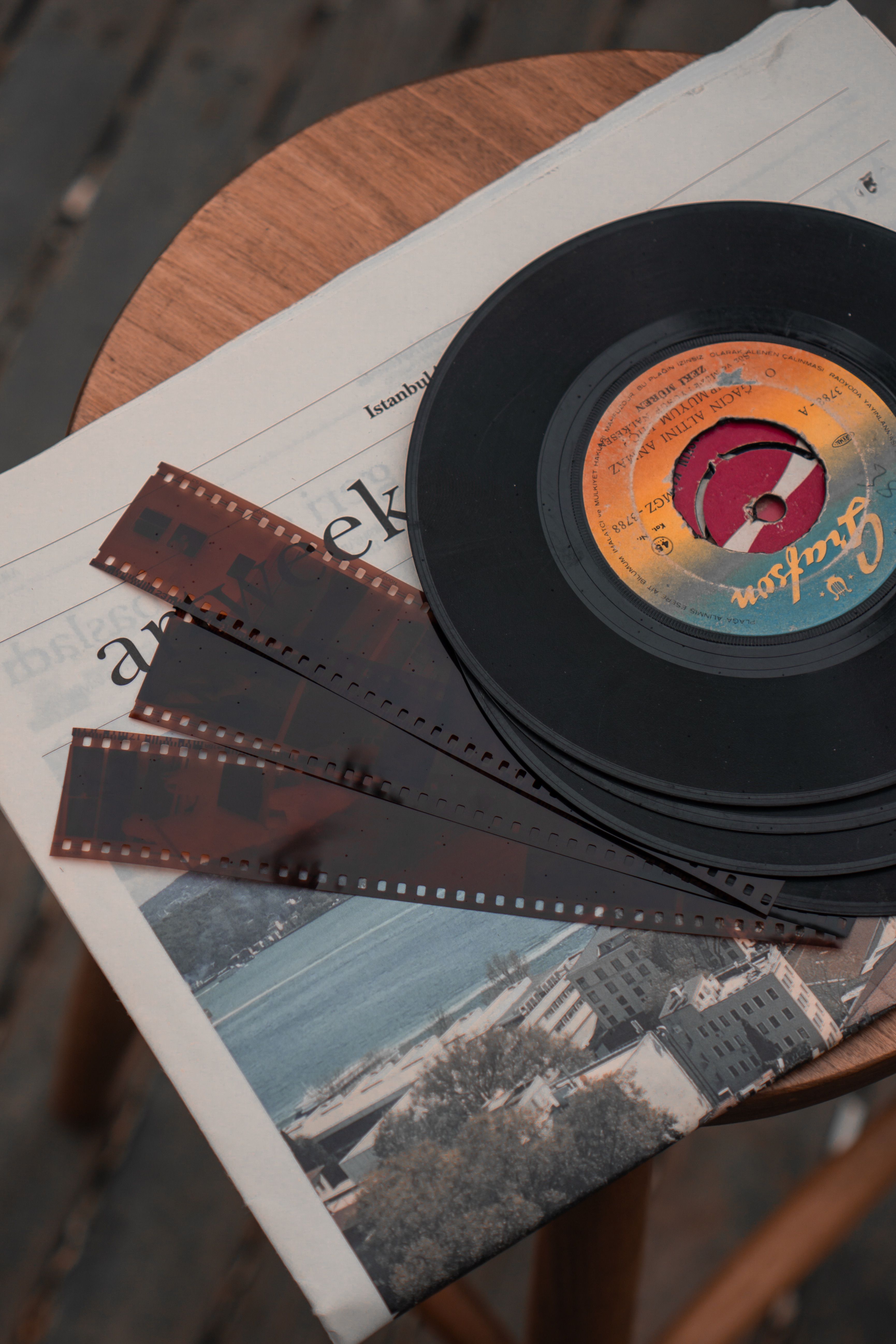 Vinyl Records and Strips of Analogue Photo Film Lying on a Table · Free ...