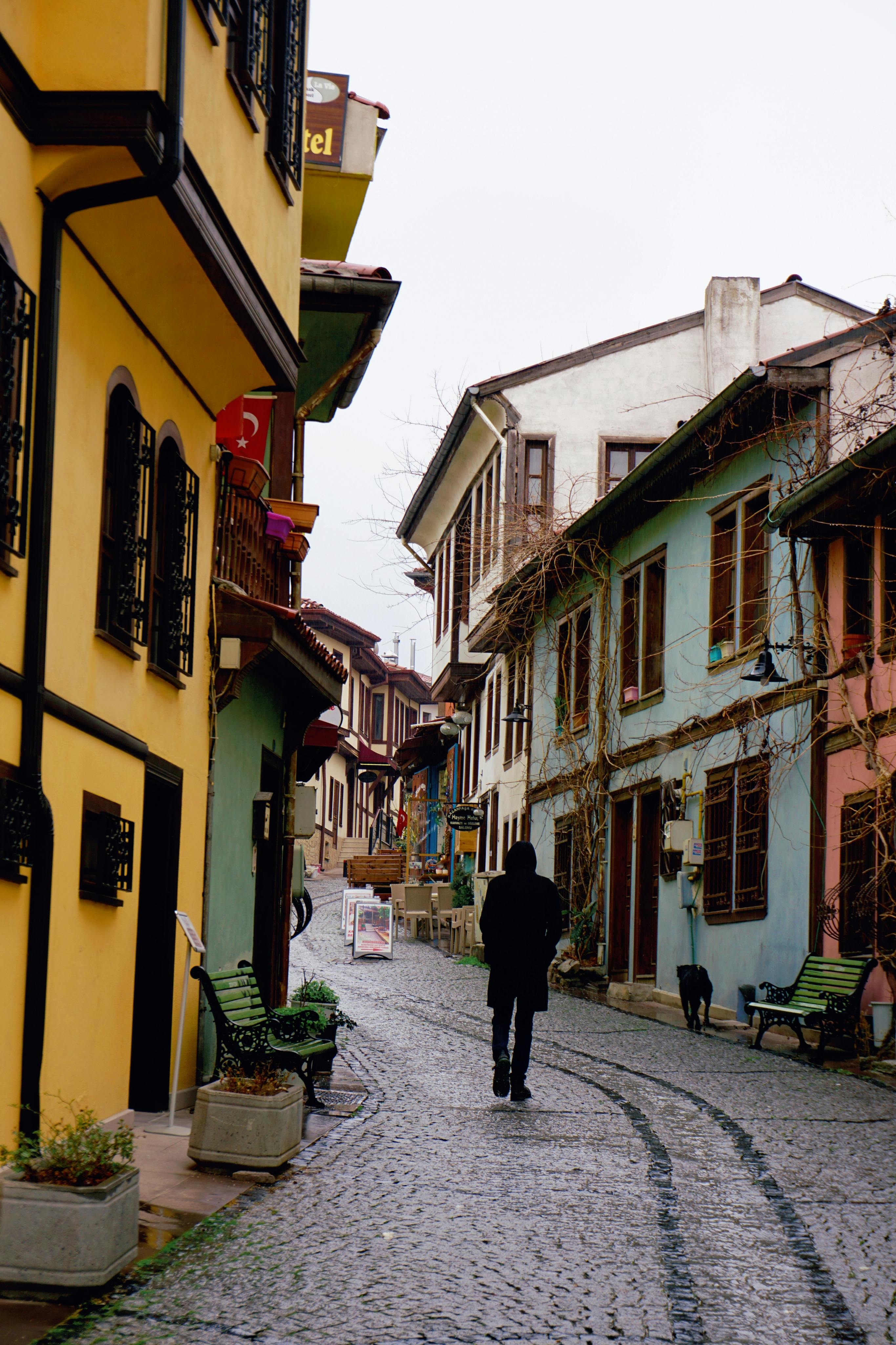 Man Walking Down Street · Free Stock Photo