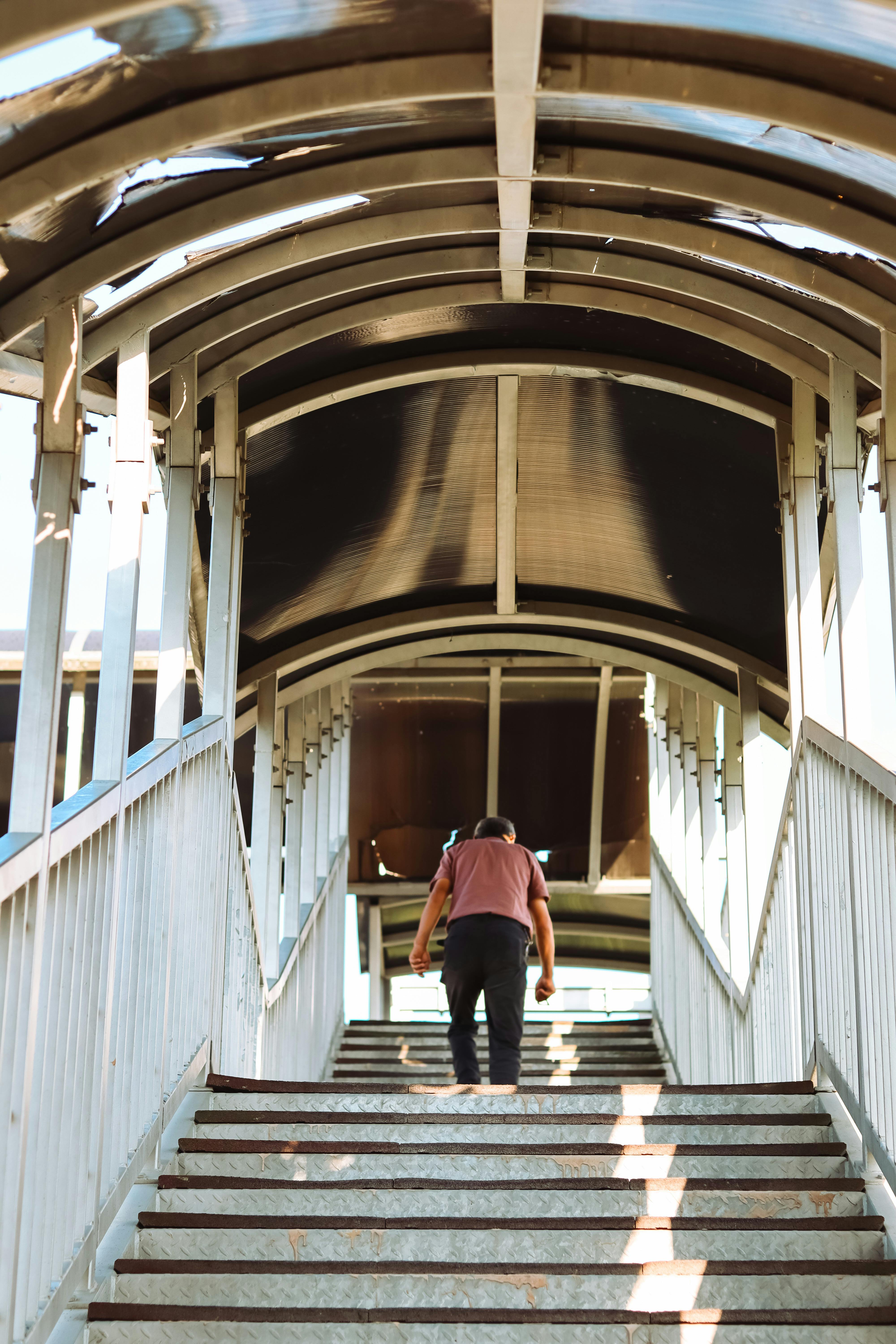 Person Walking Upstairs · Free Stock Photo