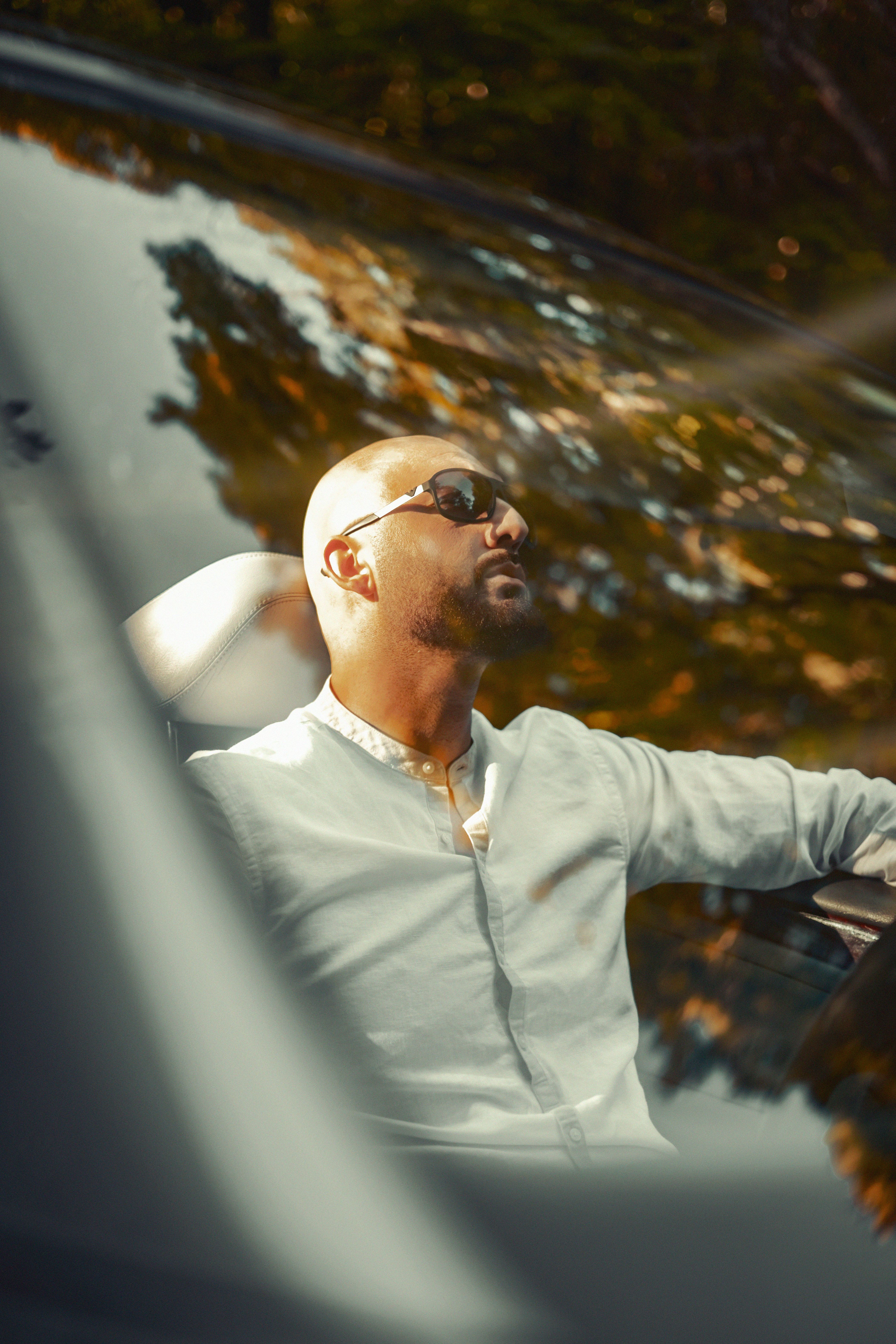 Bald Man in a Car · Free Stock Photo