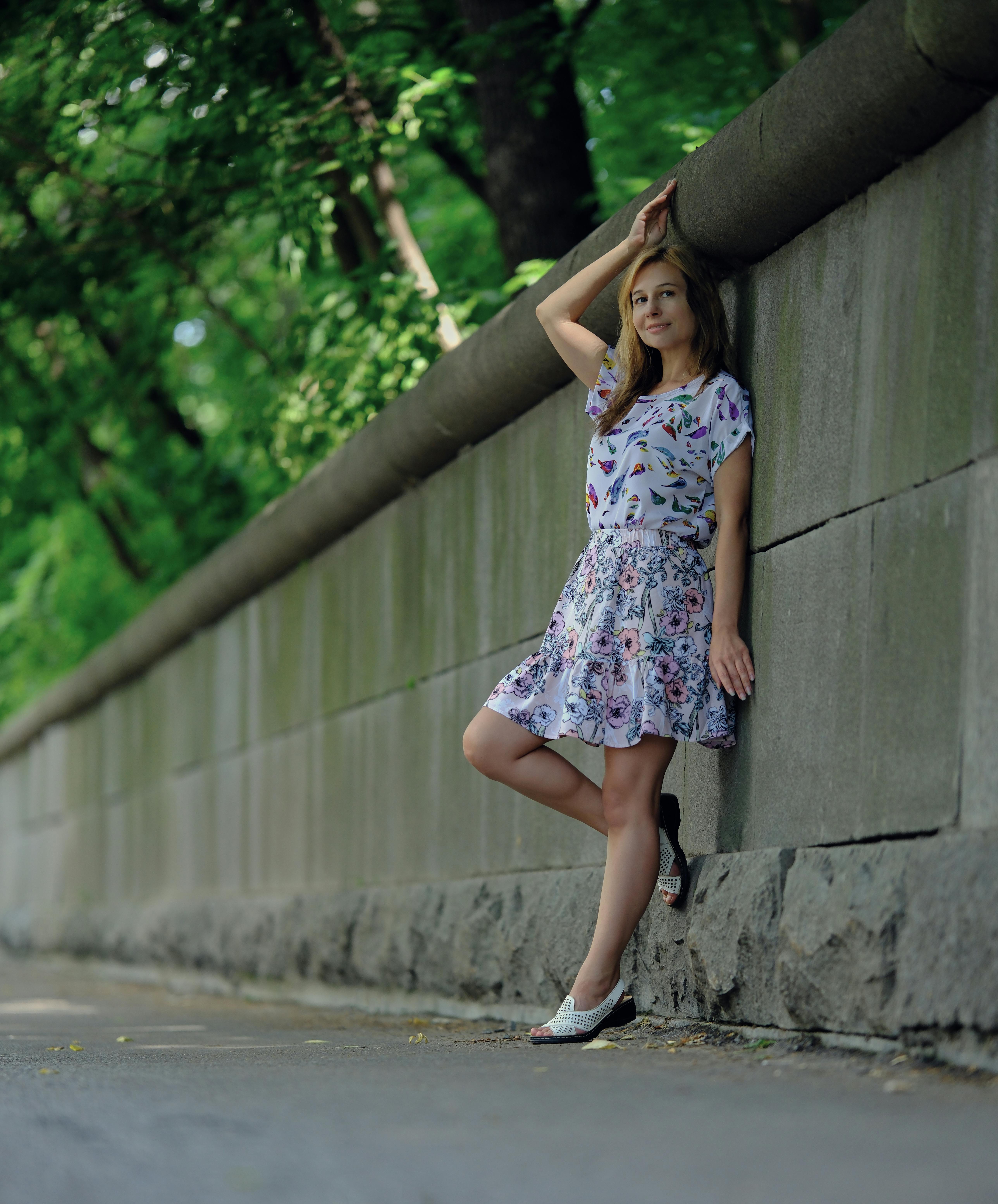Woman Standing by the Wall · Free Stock Photo