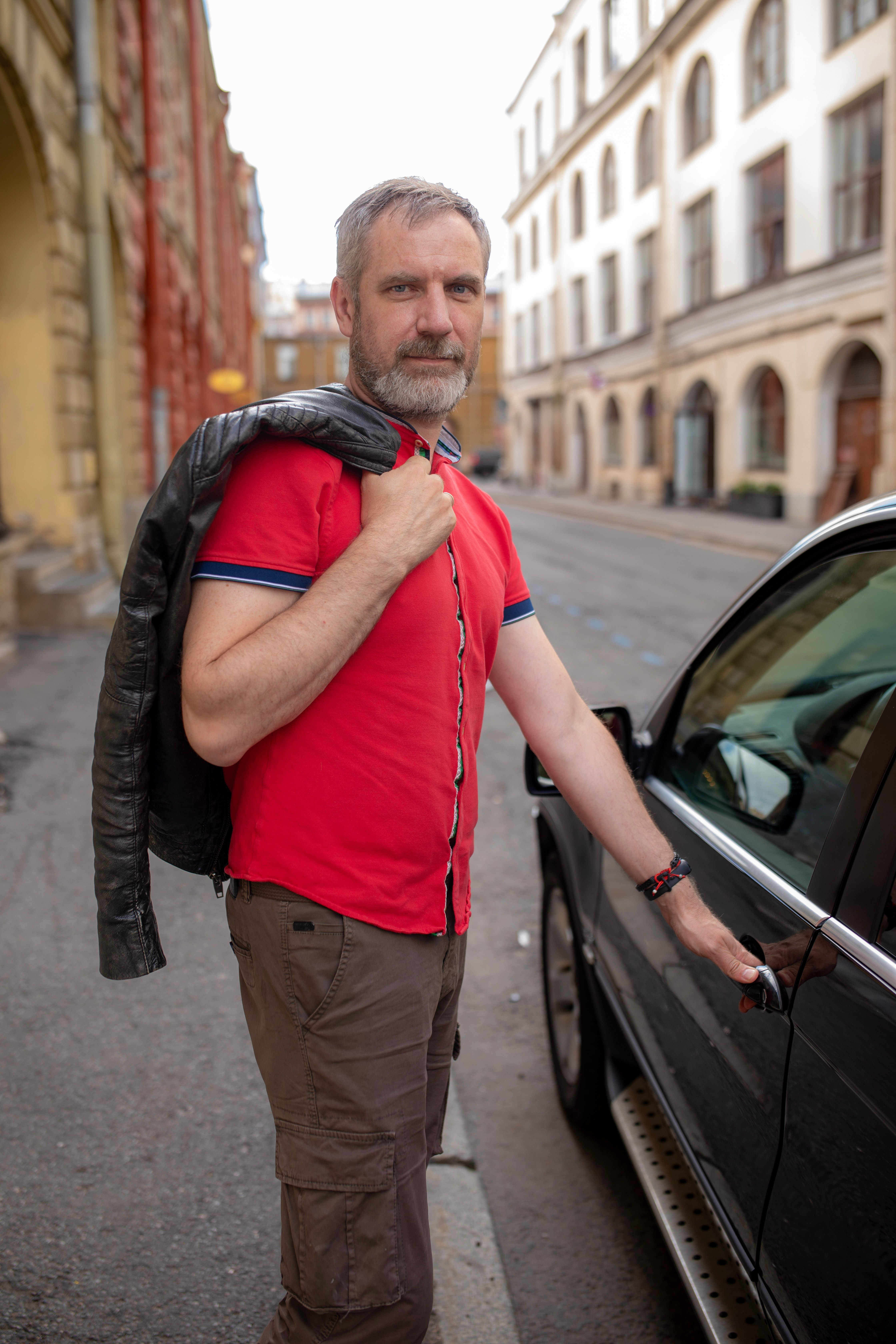 Man Standing by Car on Street · Free Stock Photo