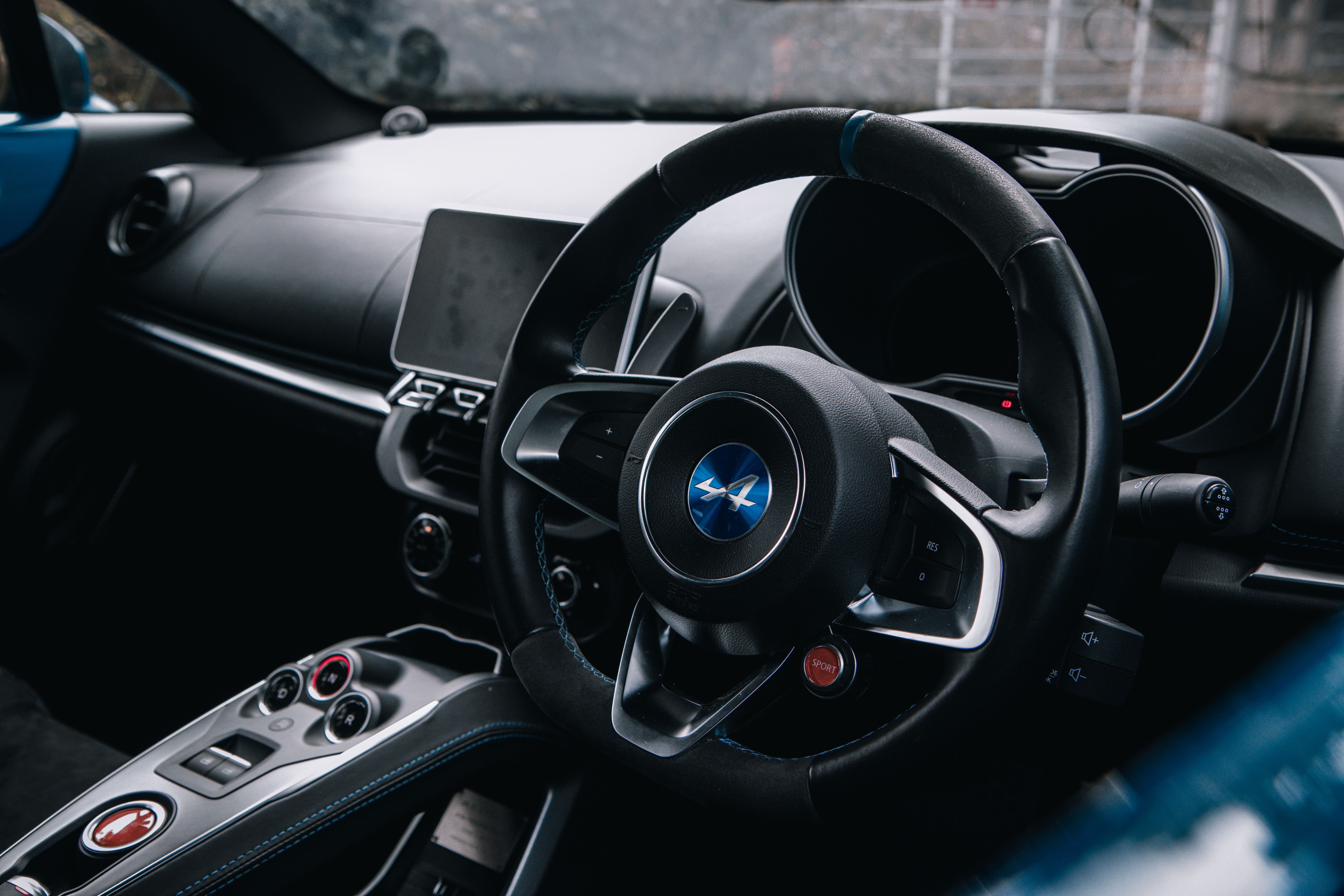 Steering Wheel and Interior of Alpine A110 Sports Car · Free Stock Photo