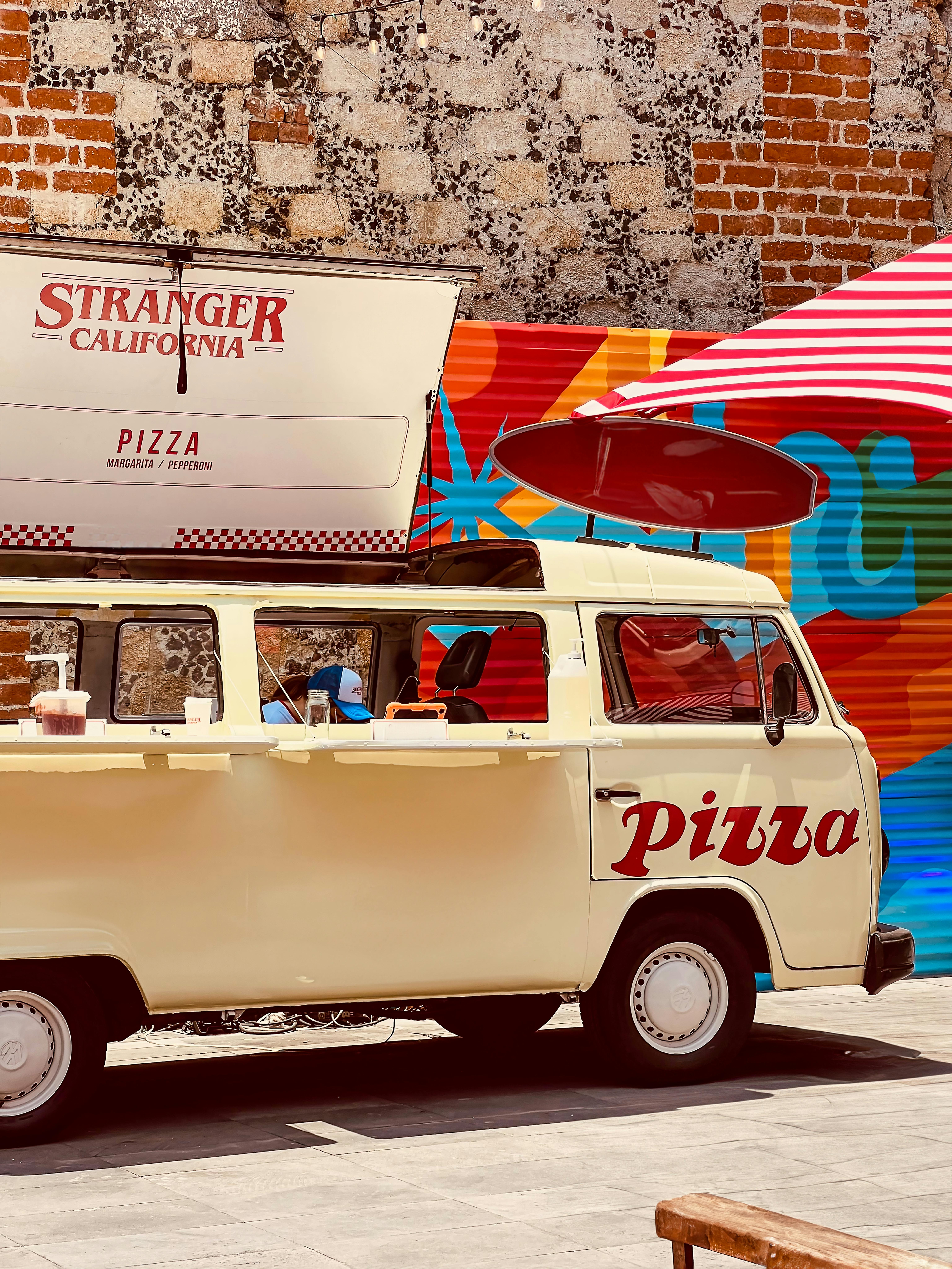 Stranger Things Themed Food Truck Serving Pizza · Free Stock Photo