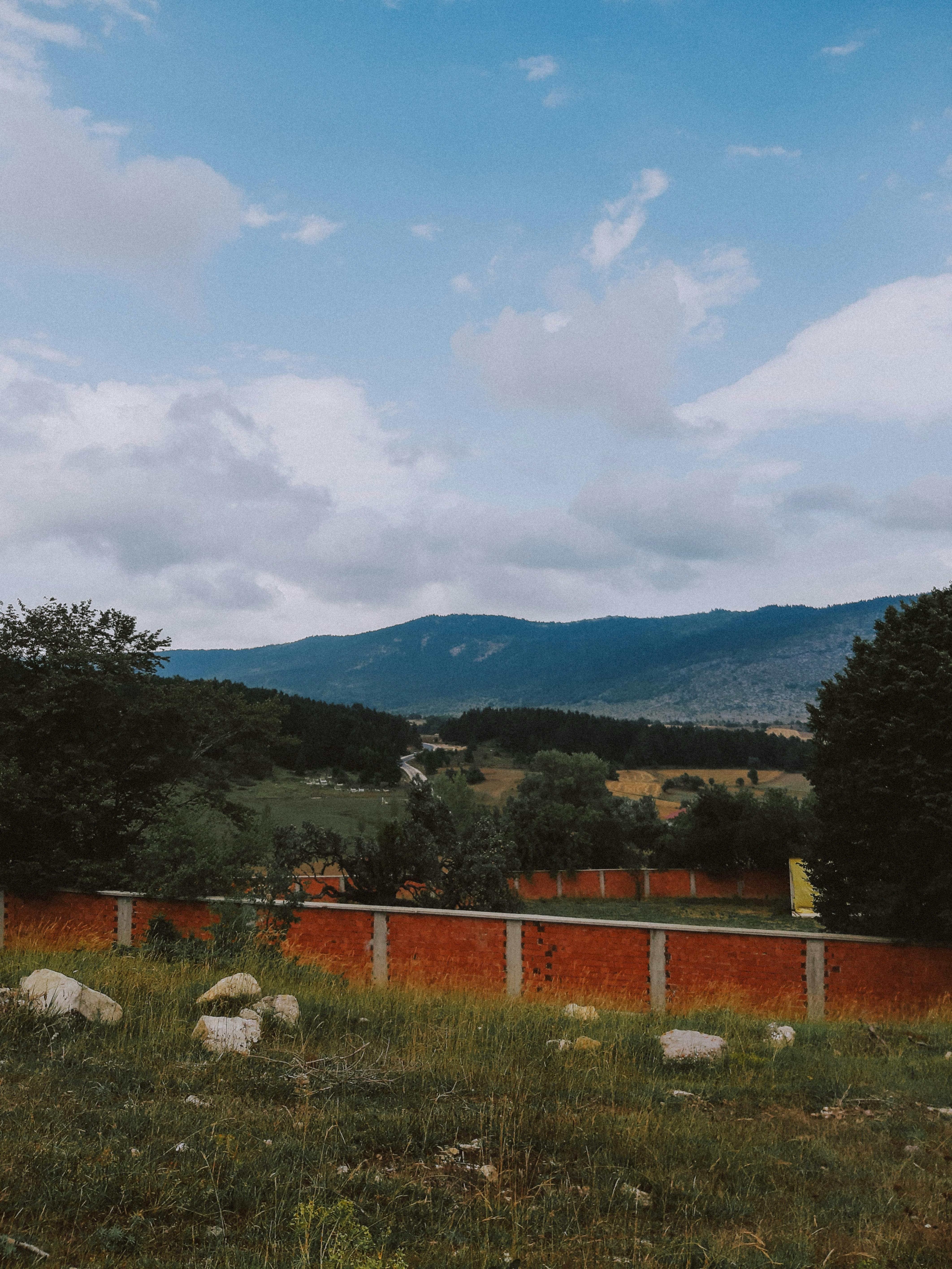 Pasture and Wall in Countryside · Free Stock Photo