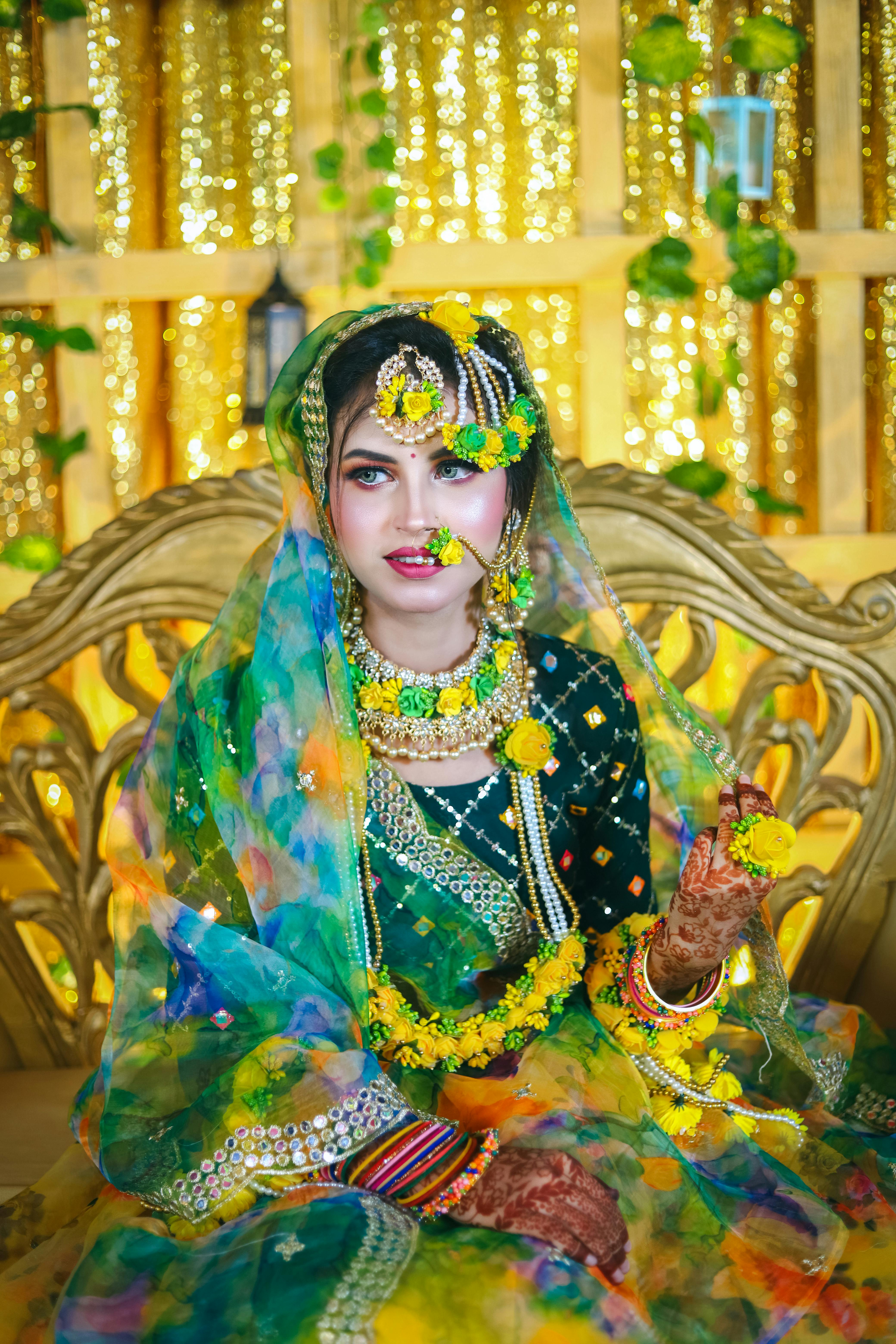 Young Woman in Traditional Indian Wedding Dress Sitting on a Luxury ...