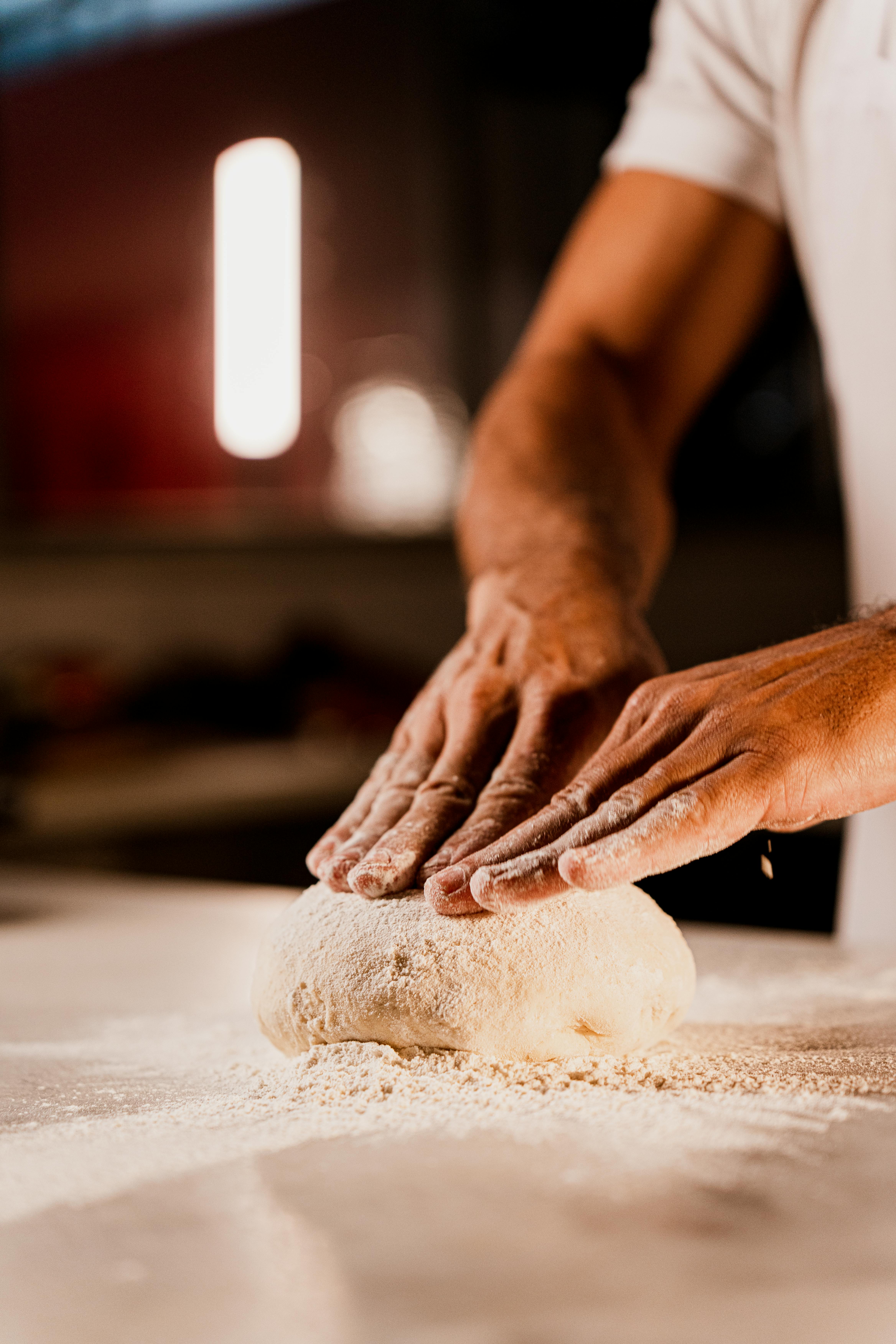 Close up of Man Hands on Dough · Free Stock Photo