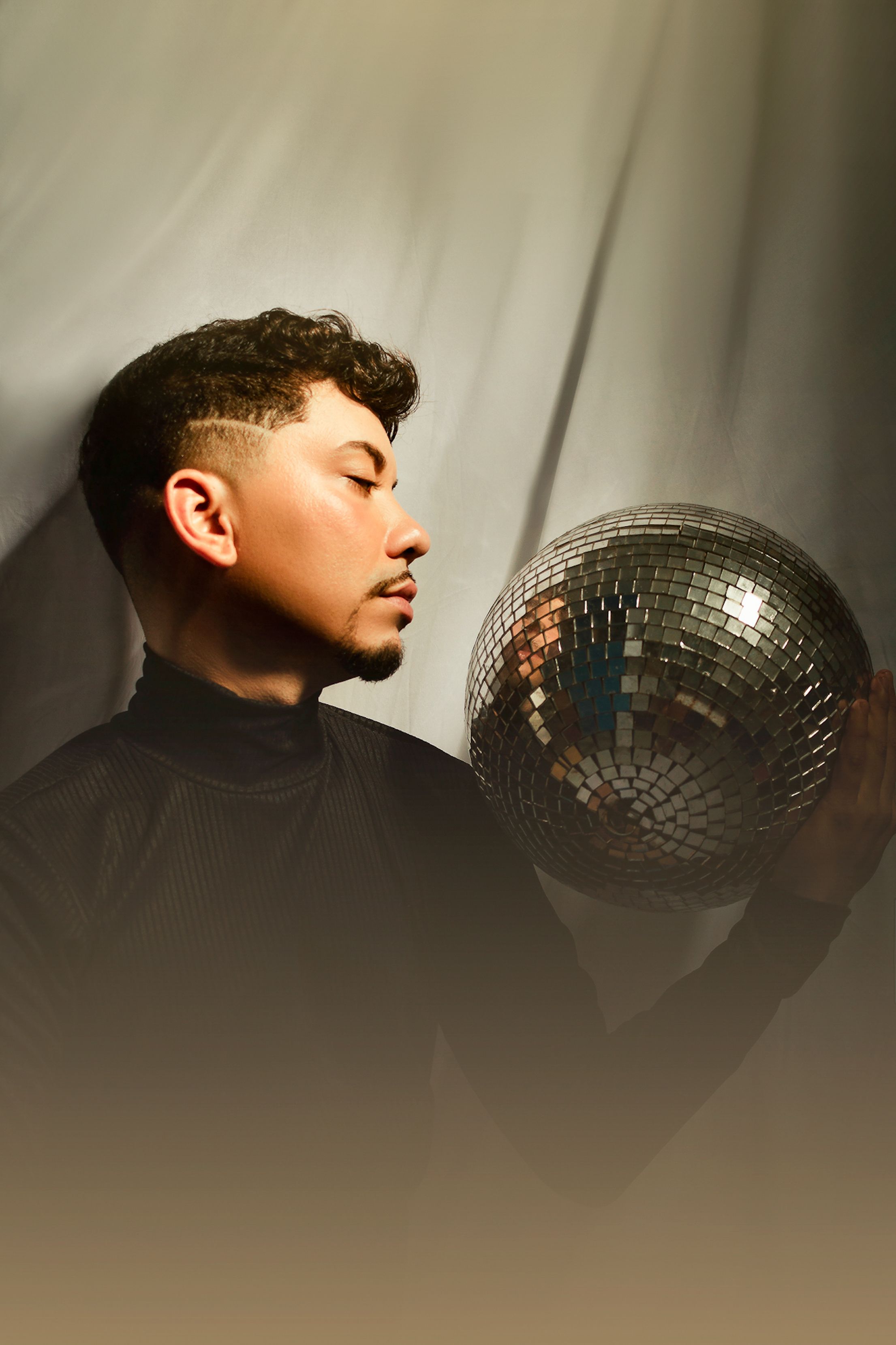 Man Holding Disco Ball · Free Stock Photo