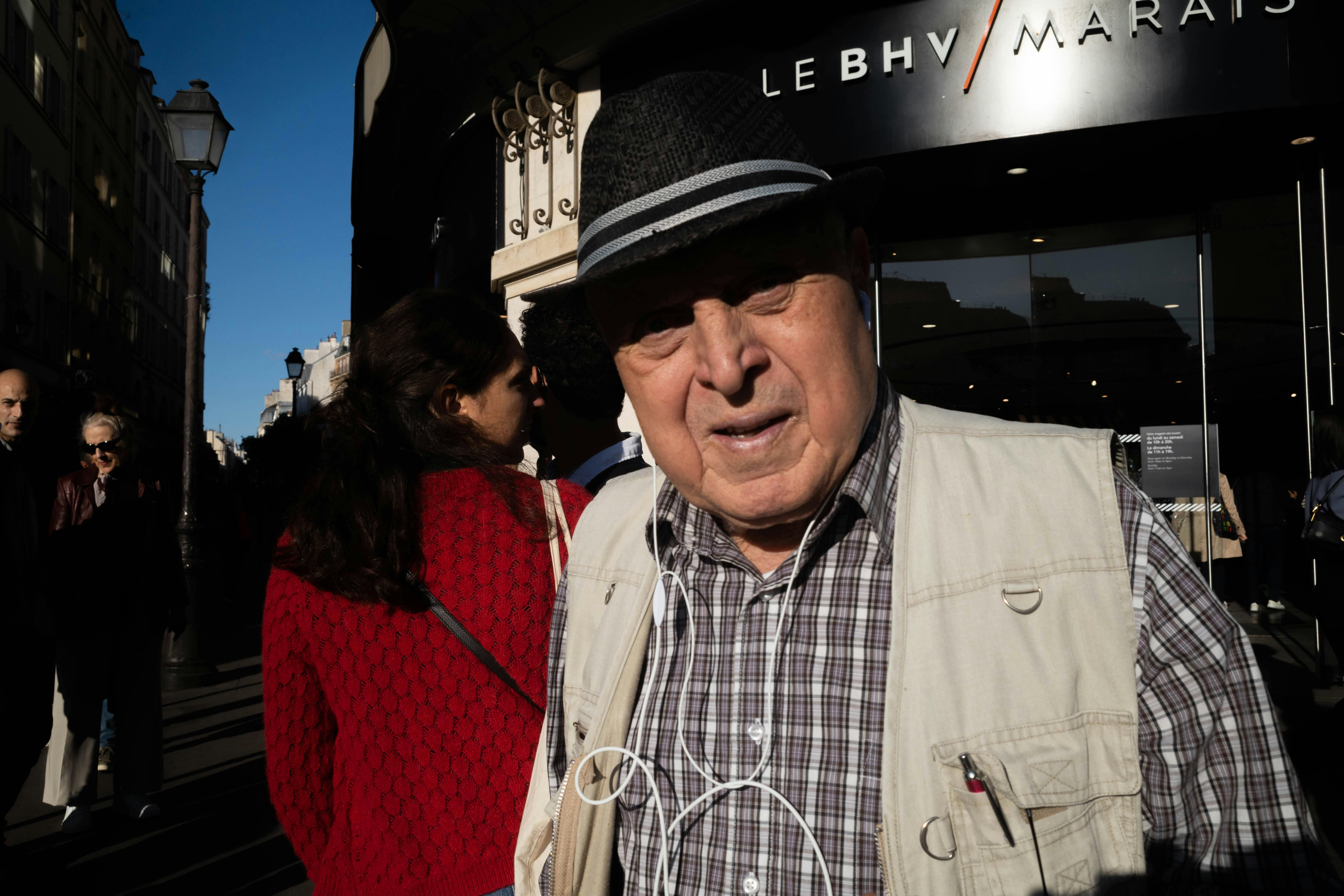 Old Man in Hat in Crowd on City Street · Free Stock Photo