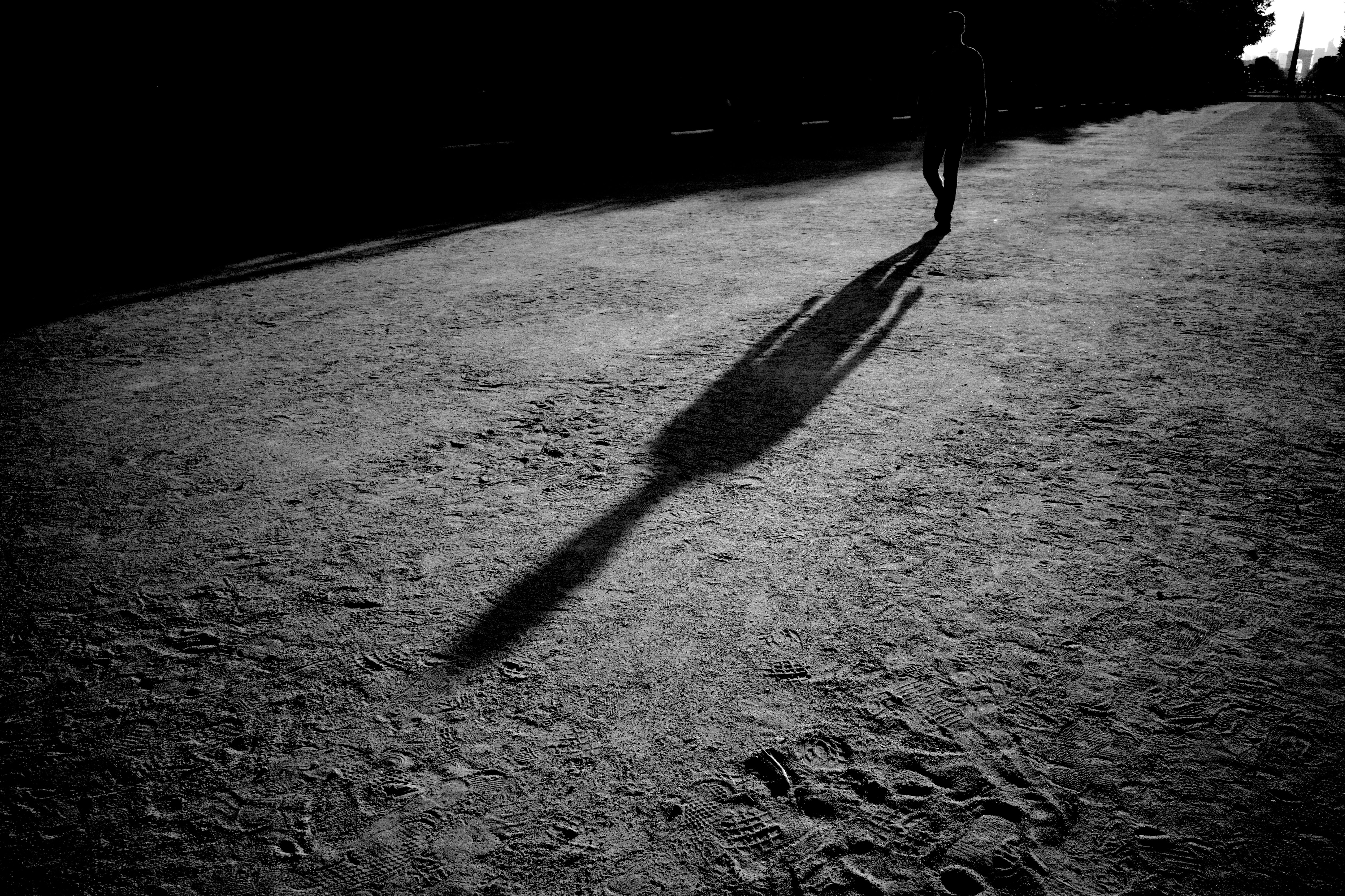 Shadow of Walking Person on Ground · Free Stock Photo