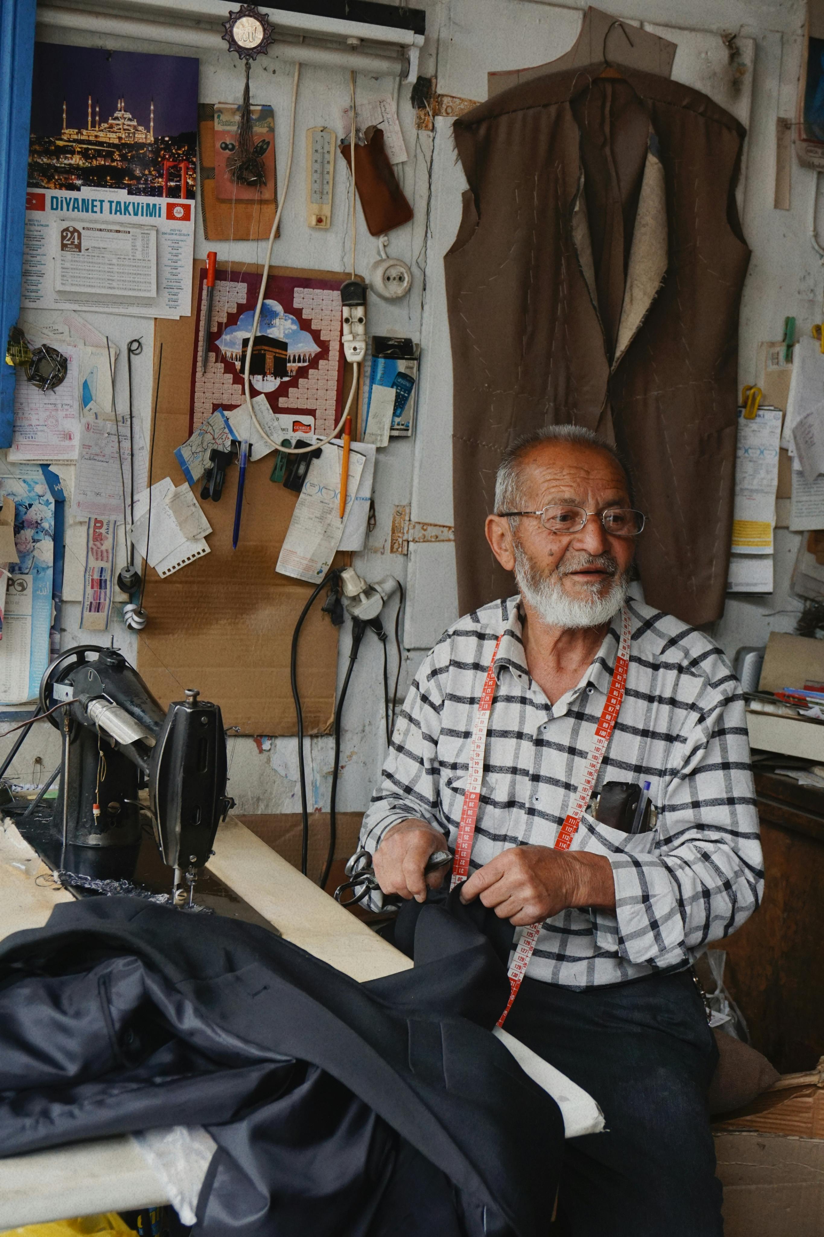 A Man using Sewing Machine · Free Stock Photo