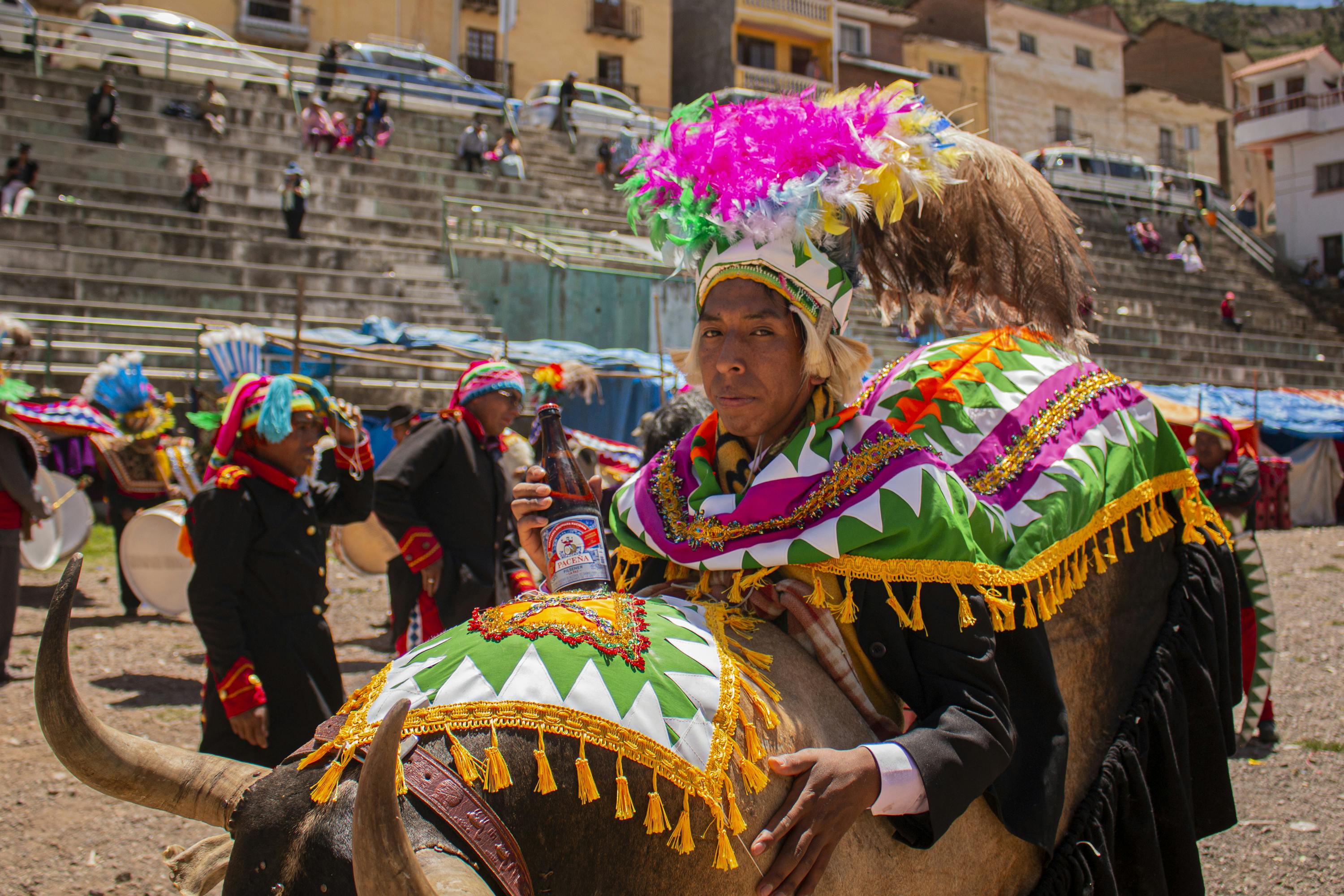 People in Traditional Costumes on a Stadium · Free Stock Photo