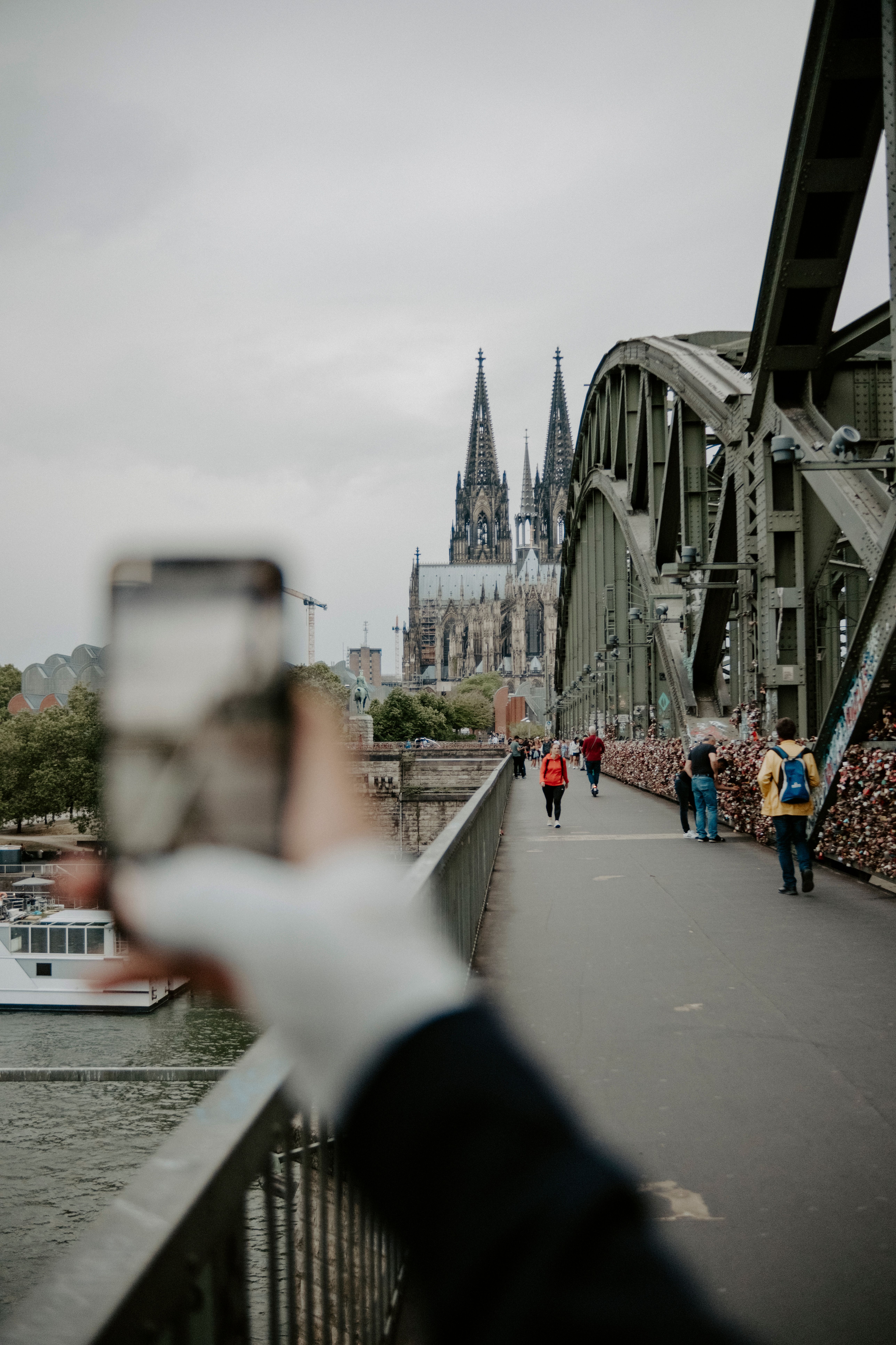 Person Taking a Picture of the Cologne Cathedral from a Distance · Free ...