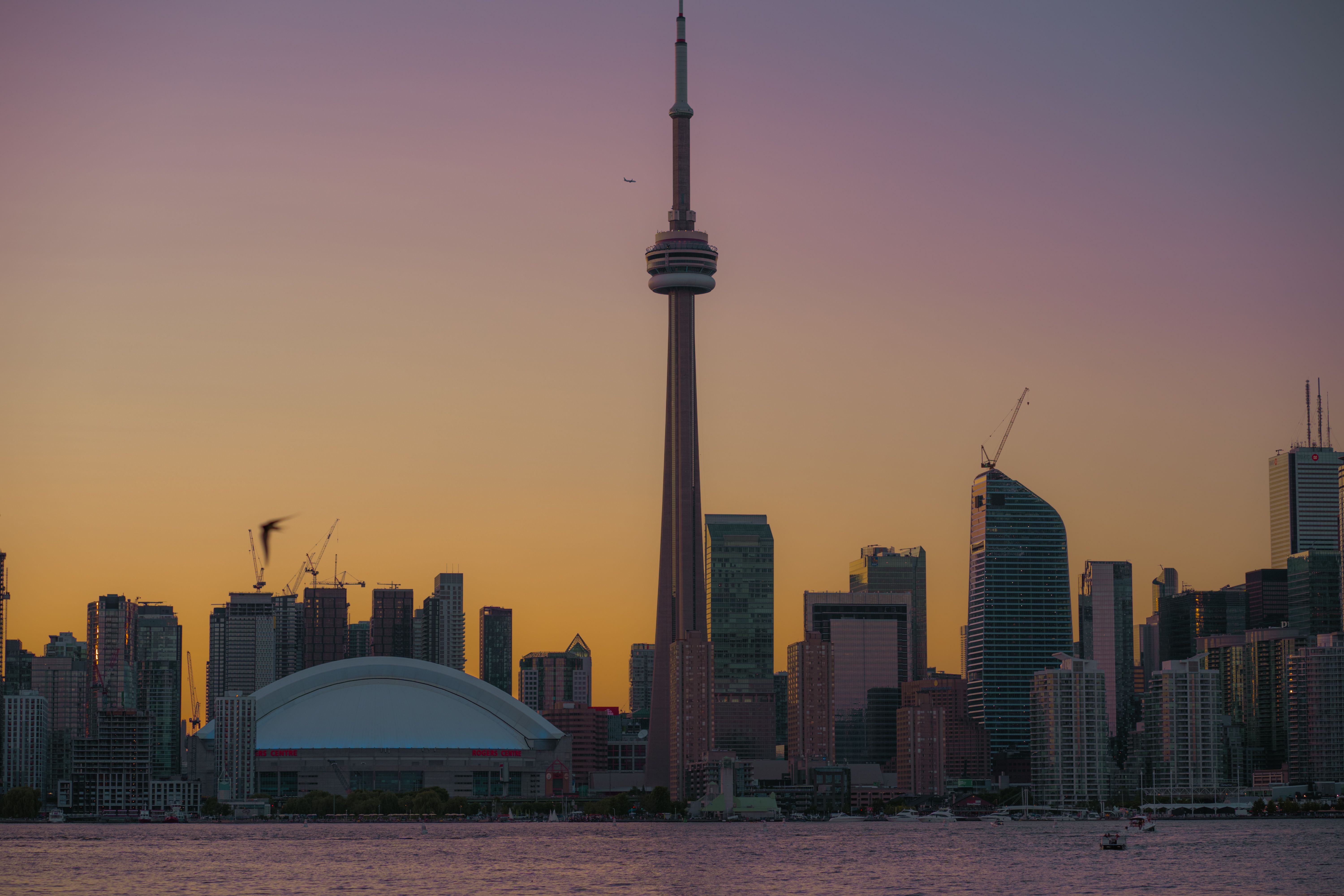 Sunset view of CN tower from Toronto Island · Free Stock Photo