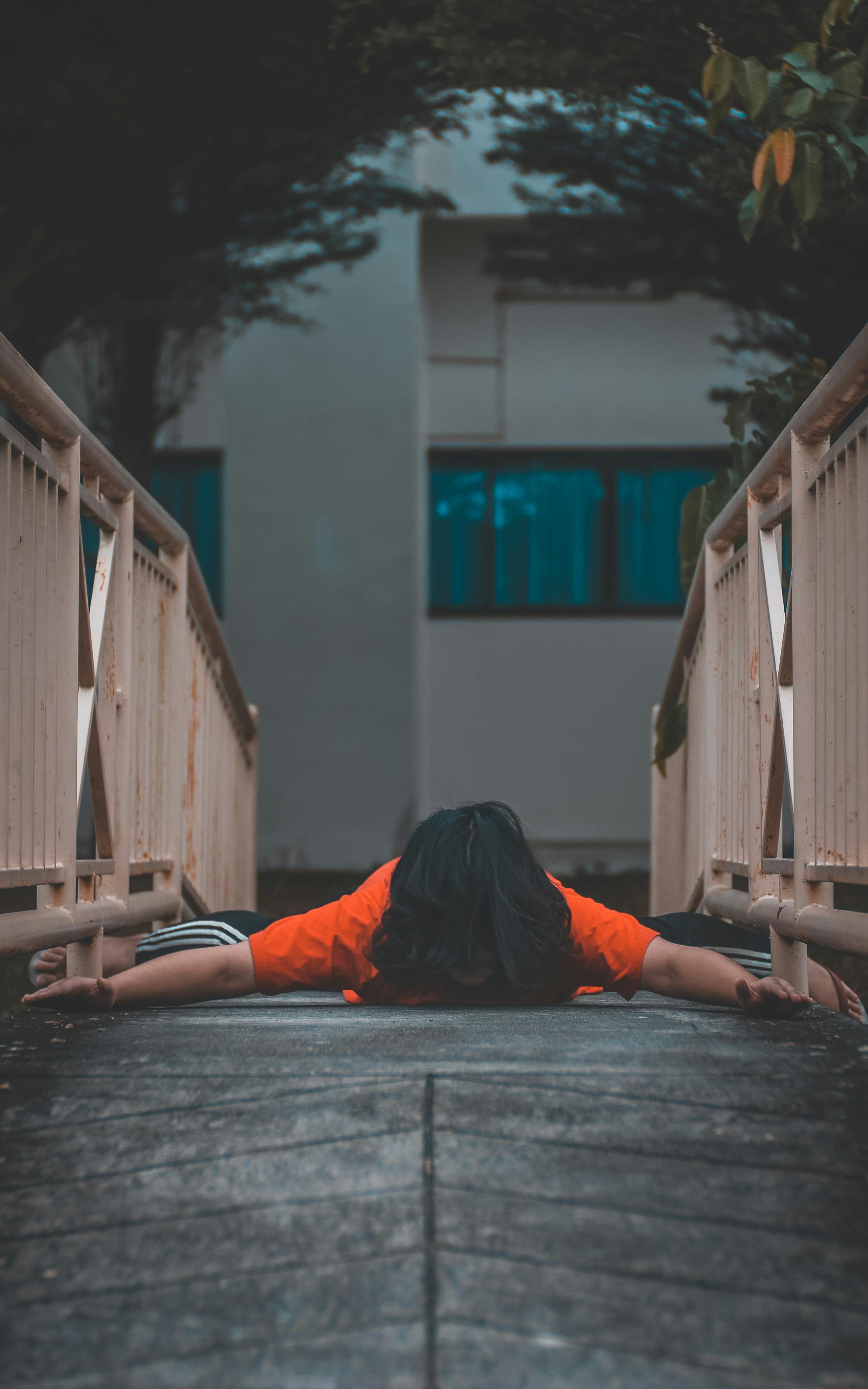 Woman Standing on Bridge · Free Stock Photo