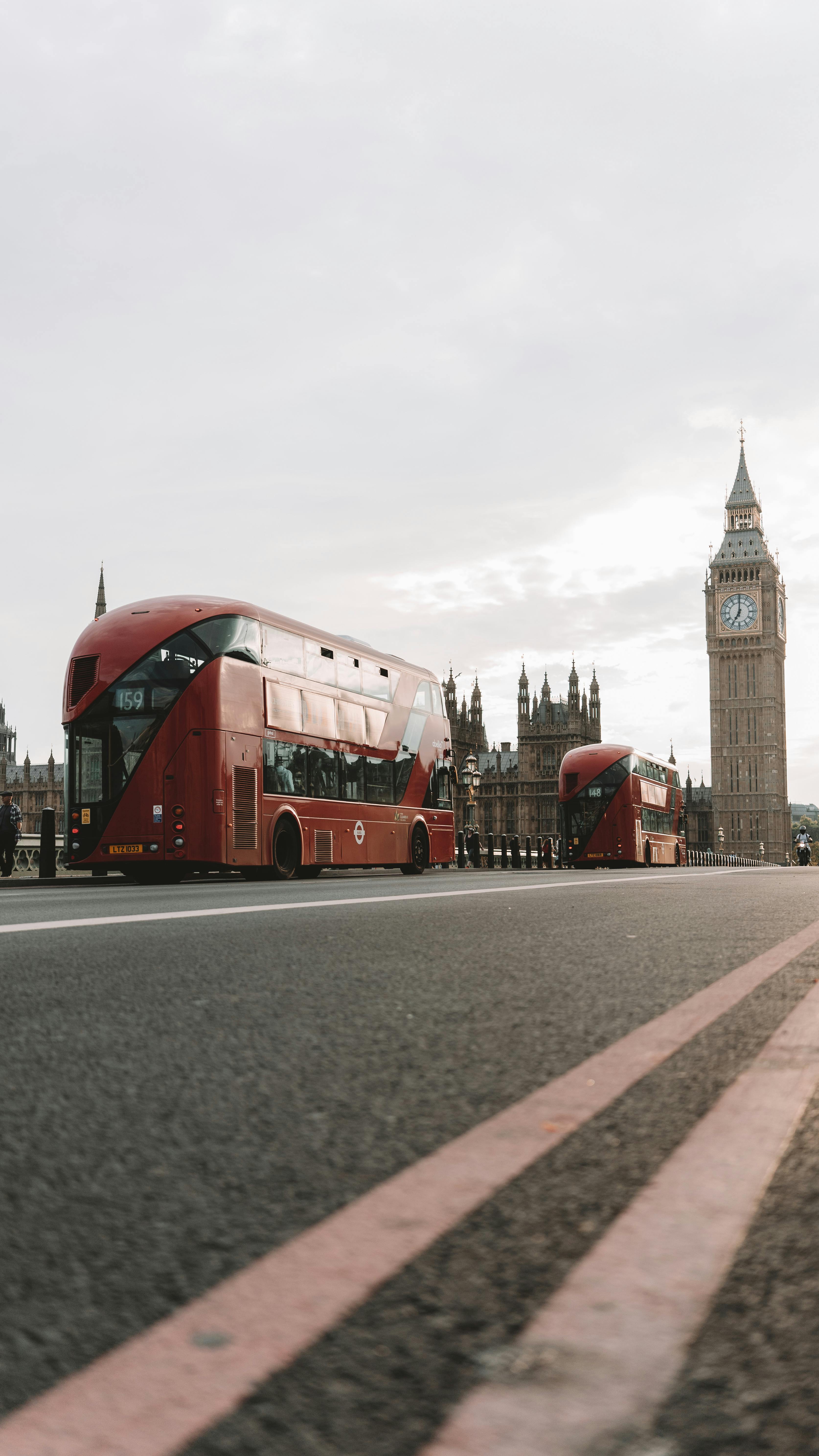 Red Double Deck Bus on Road · Free Stock Photo