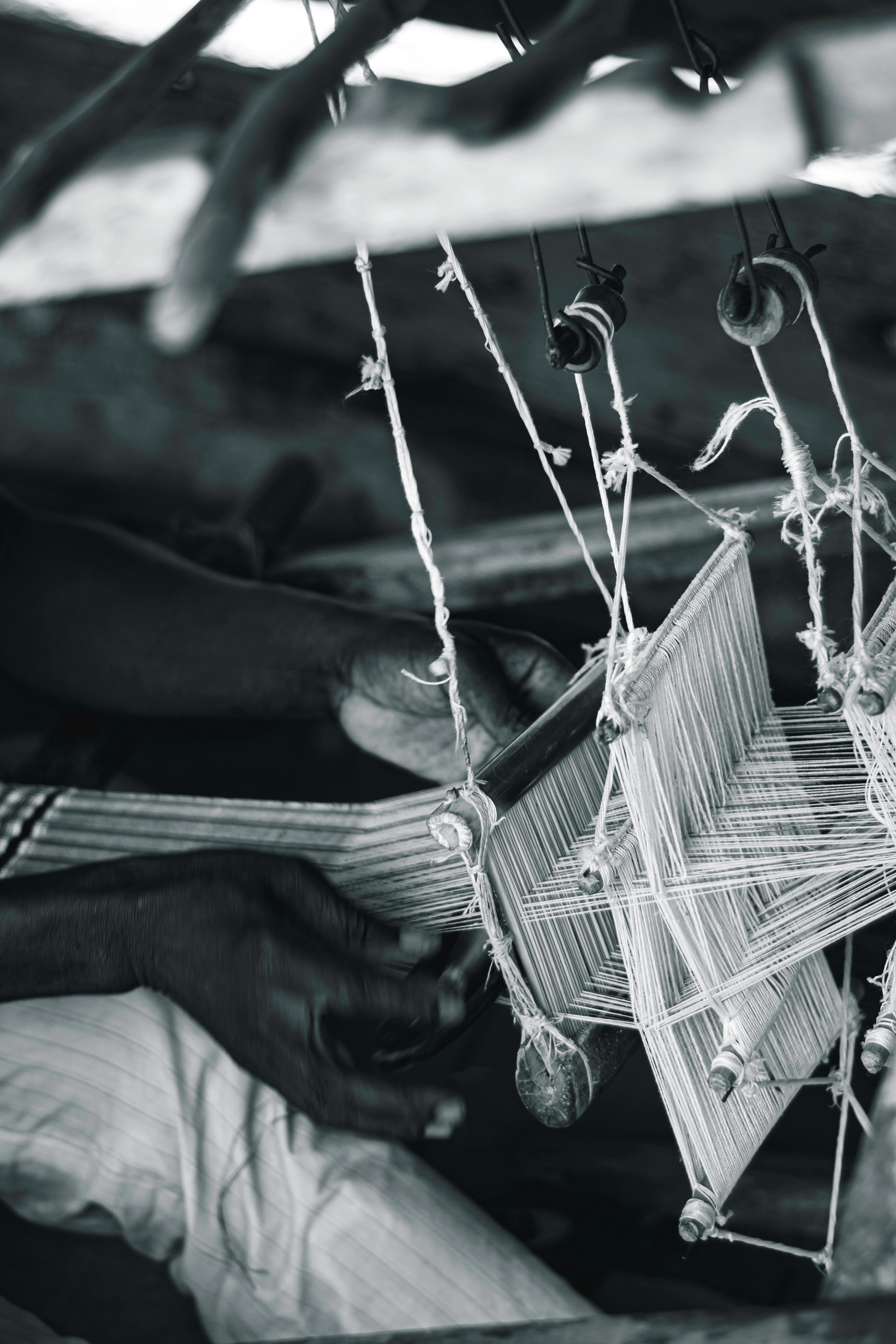 Person Weaving on Loom · Free Stock Photo
