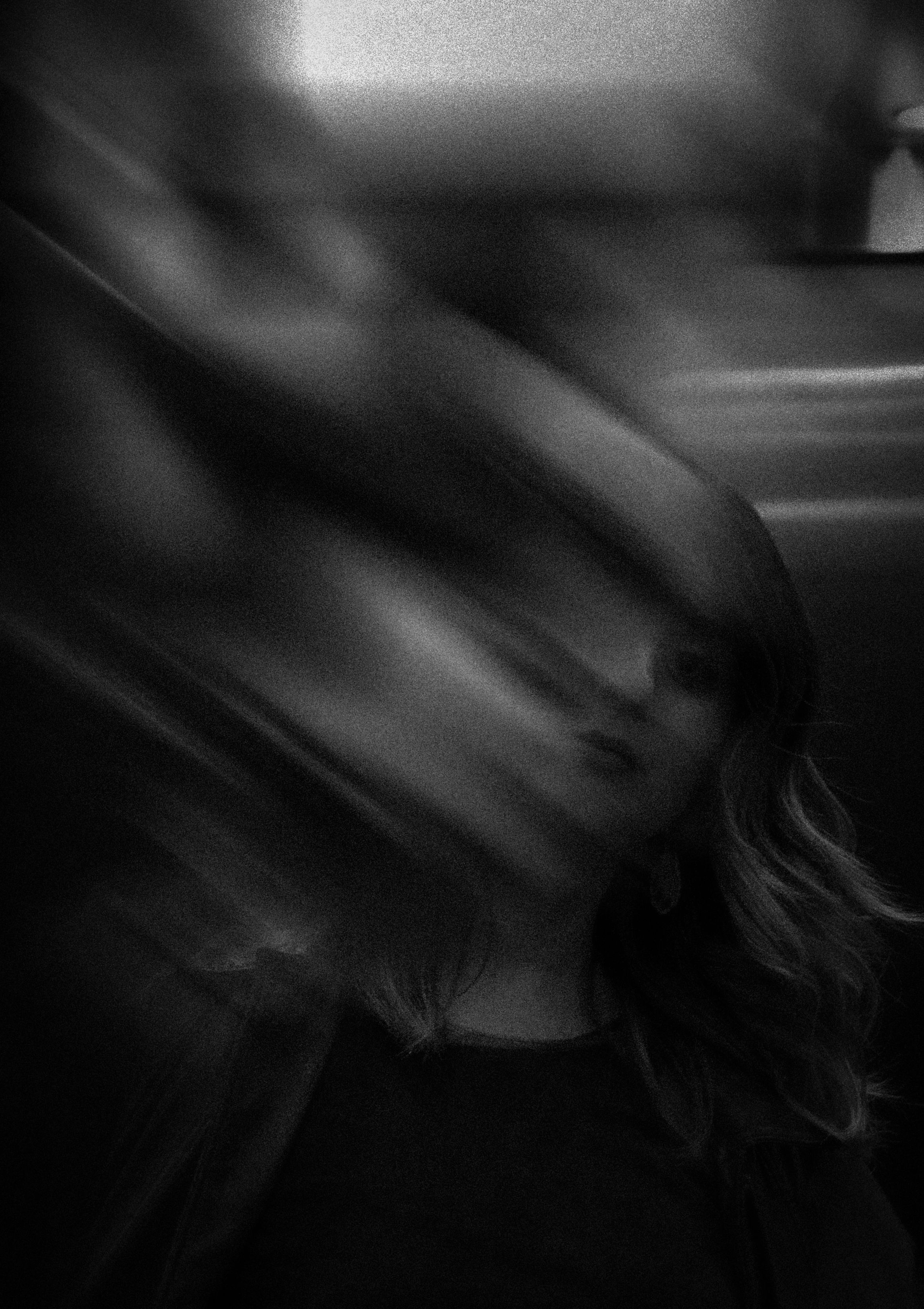 Black and White Blurry Photo of a Young Woman · Free Stock Photo