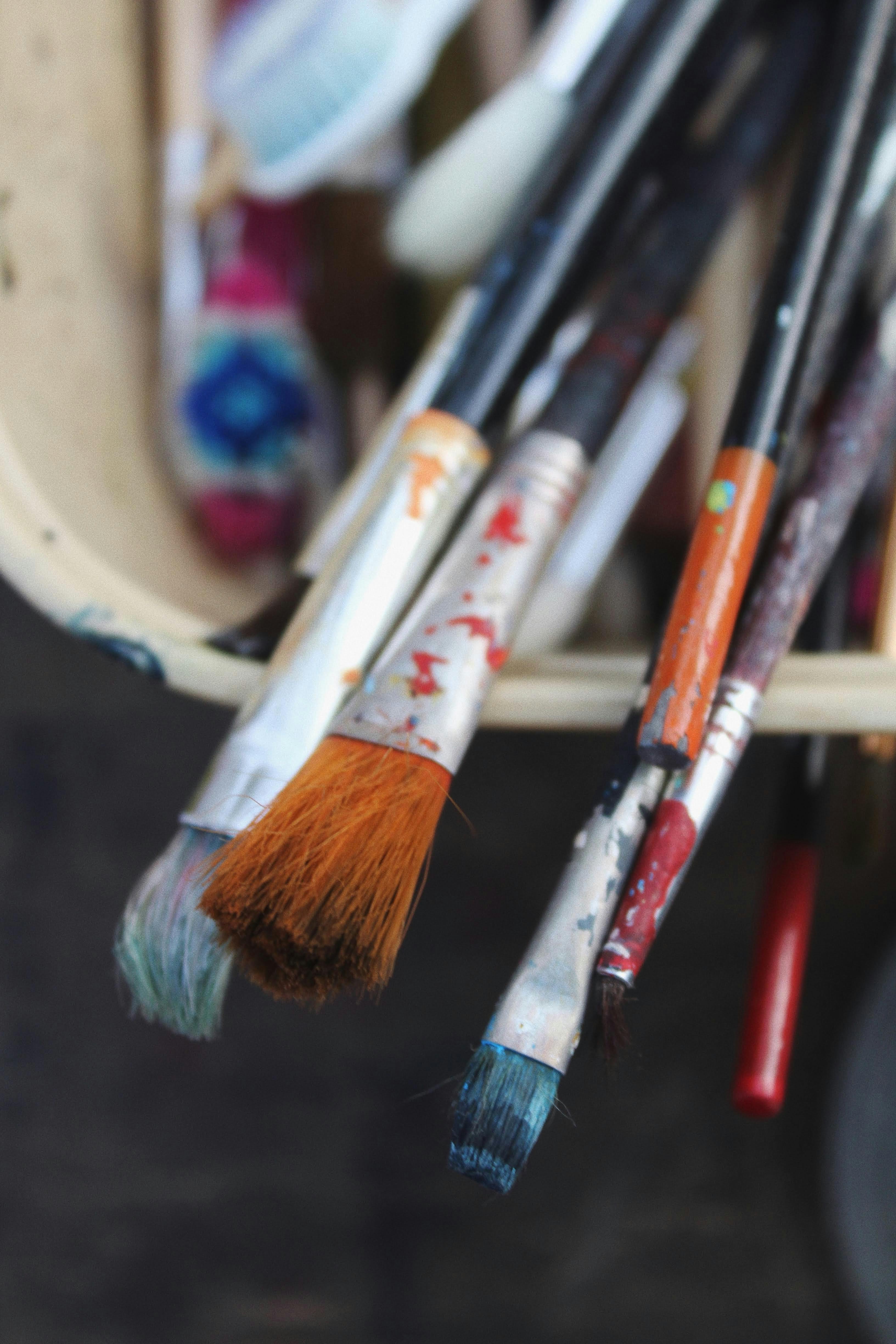 Close-up of Dirty Paintbrushes · Free Stock Photo