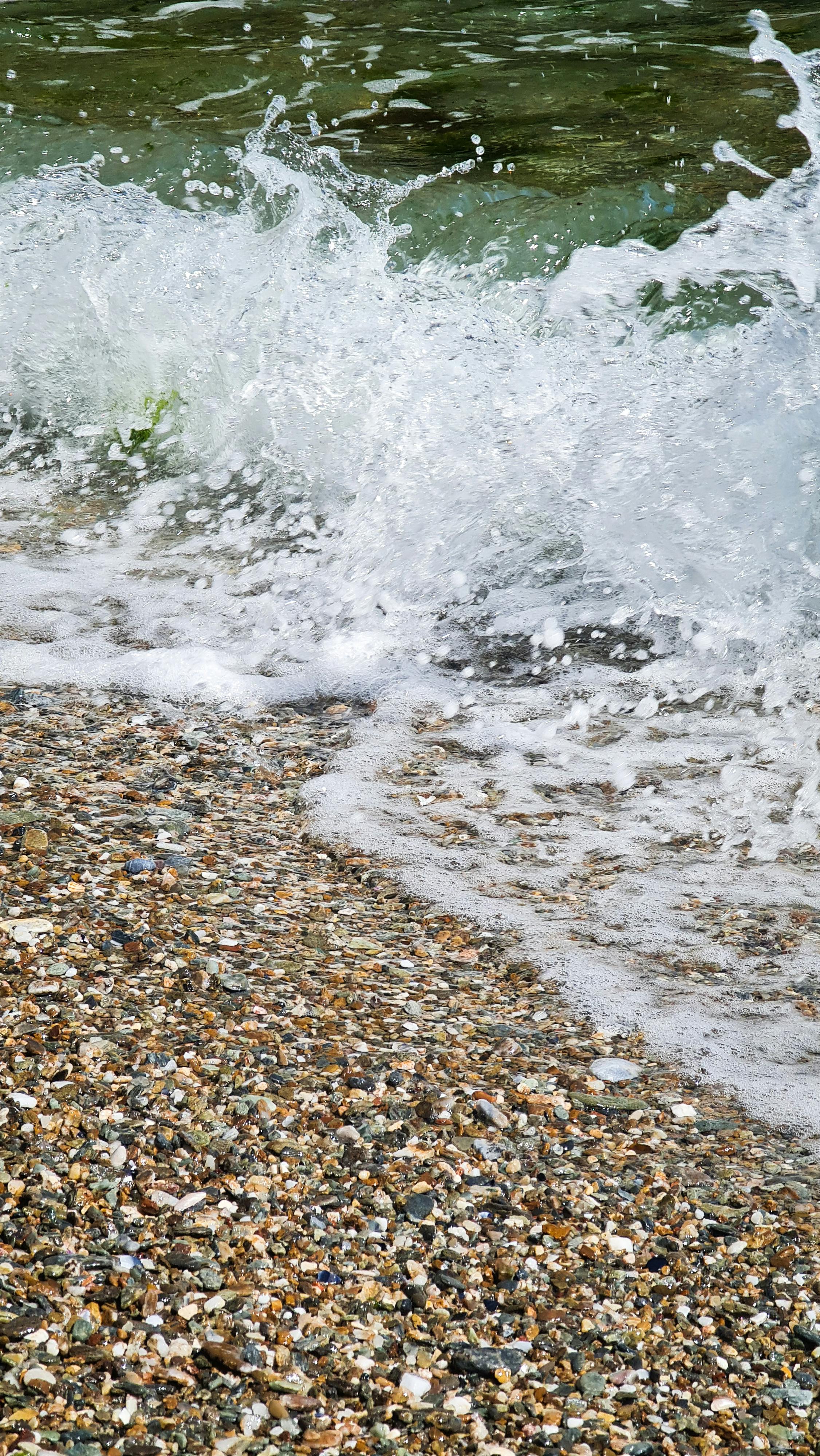 Wave Crushing on Pebbles on Shore · Free Stock Photo