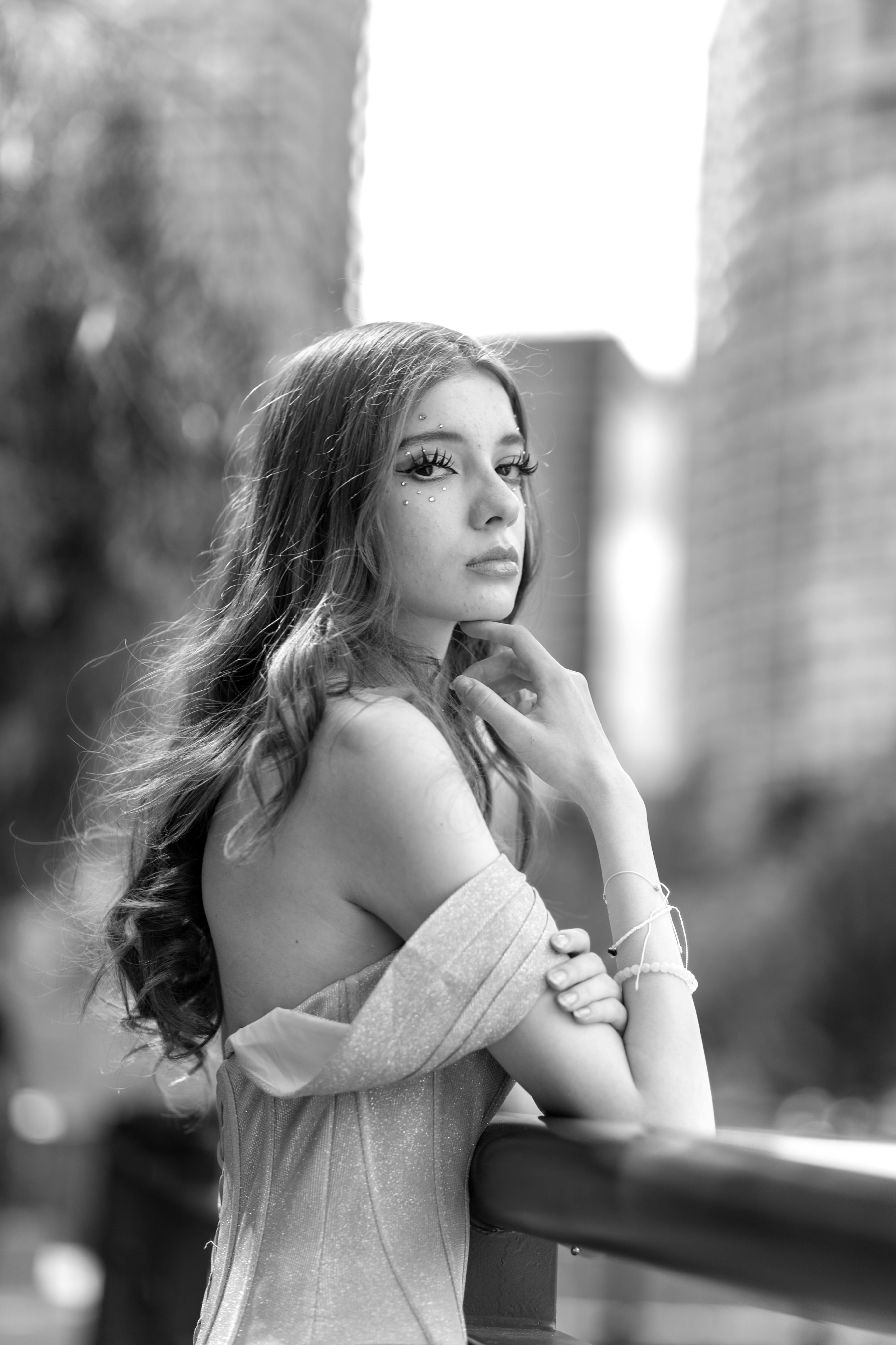 Woman Sitting on Railing · Free Stock Photo